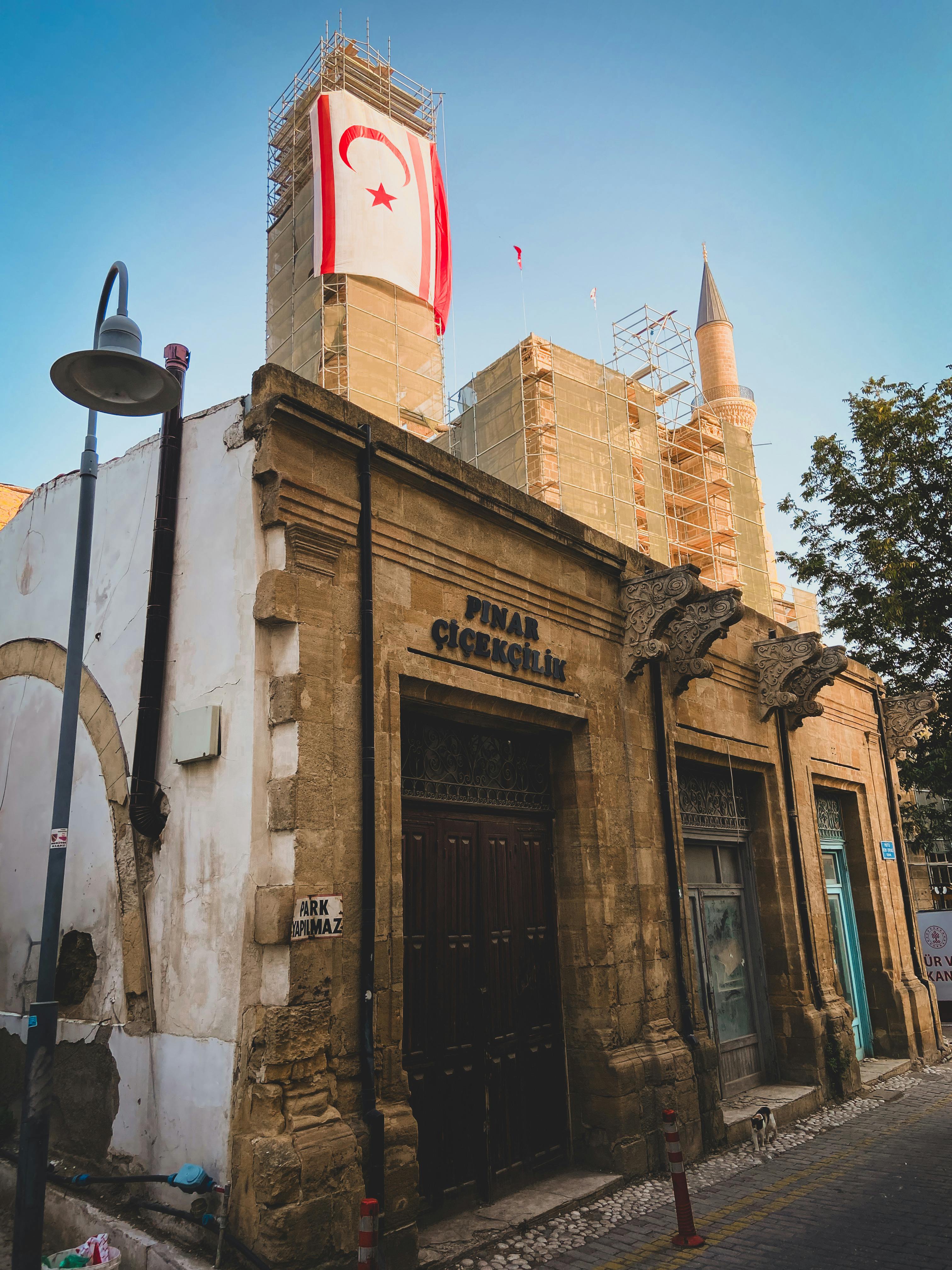 Flag of Northern Cyprus on Mosque Wall · Free Stock Photo