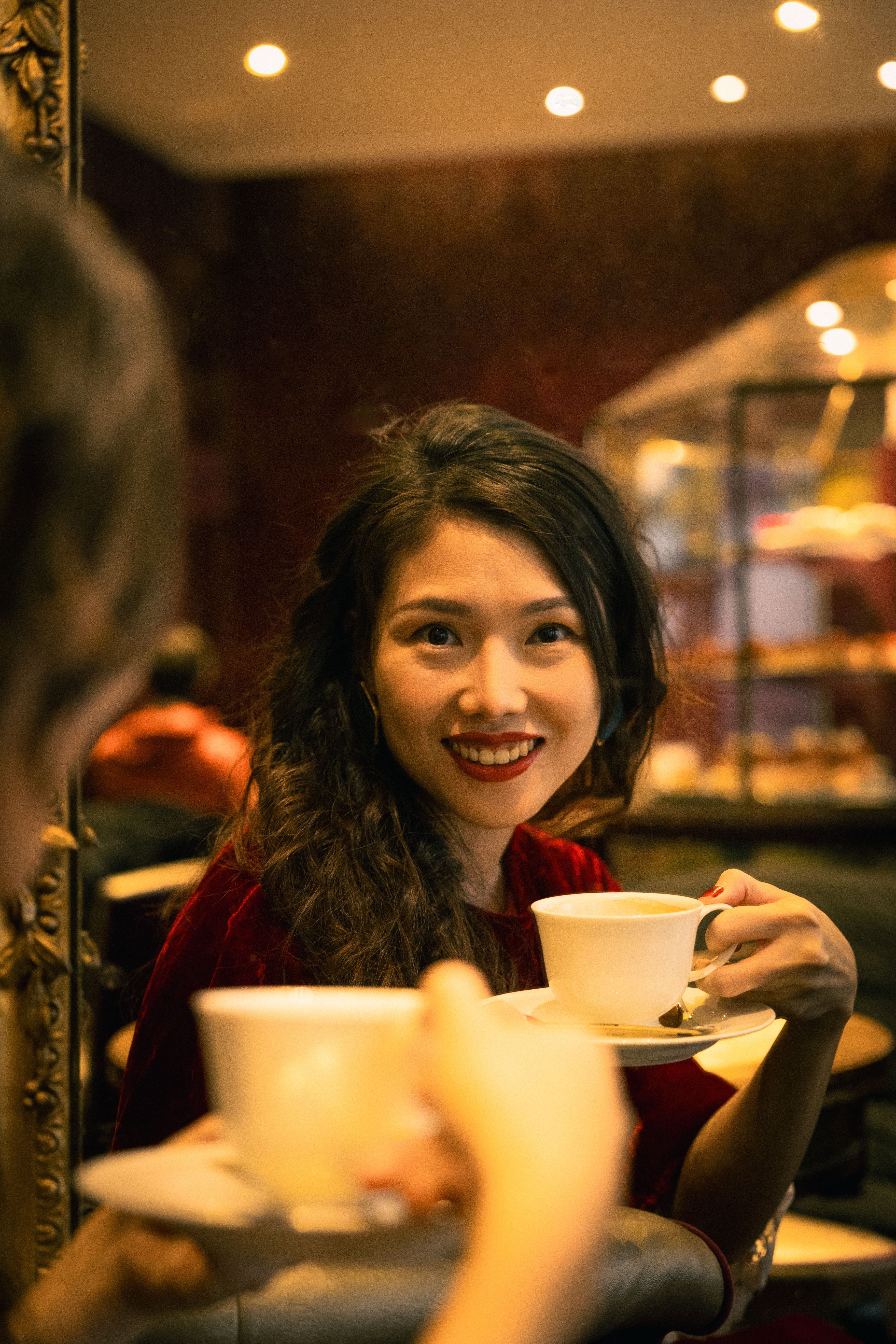 Women Drinking Coffee at Cafe · Free Stock Photo