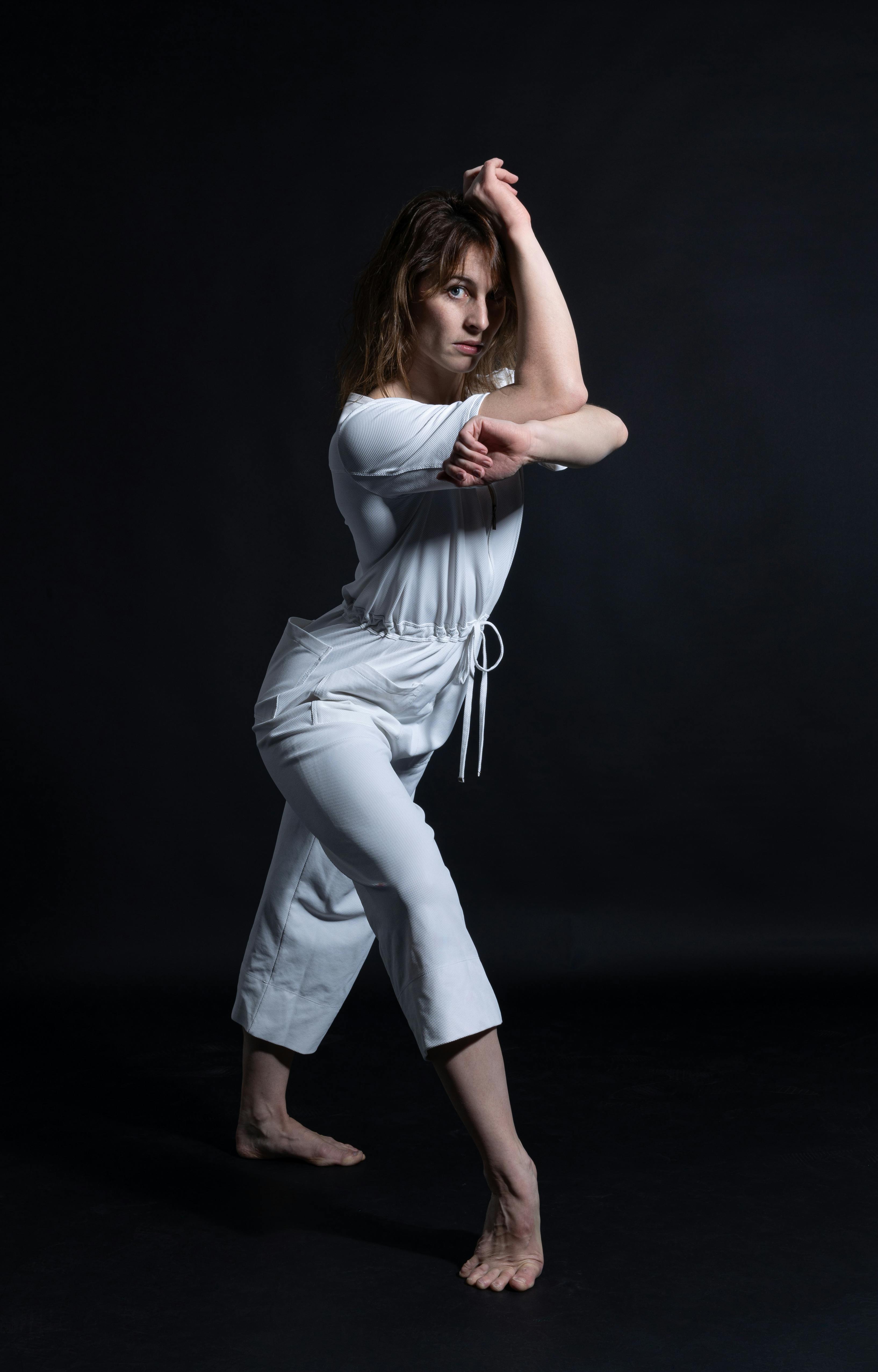 Woman Dancing in the Shadow · Free Stock Photo