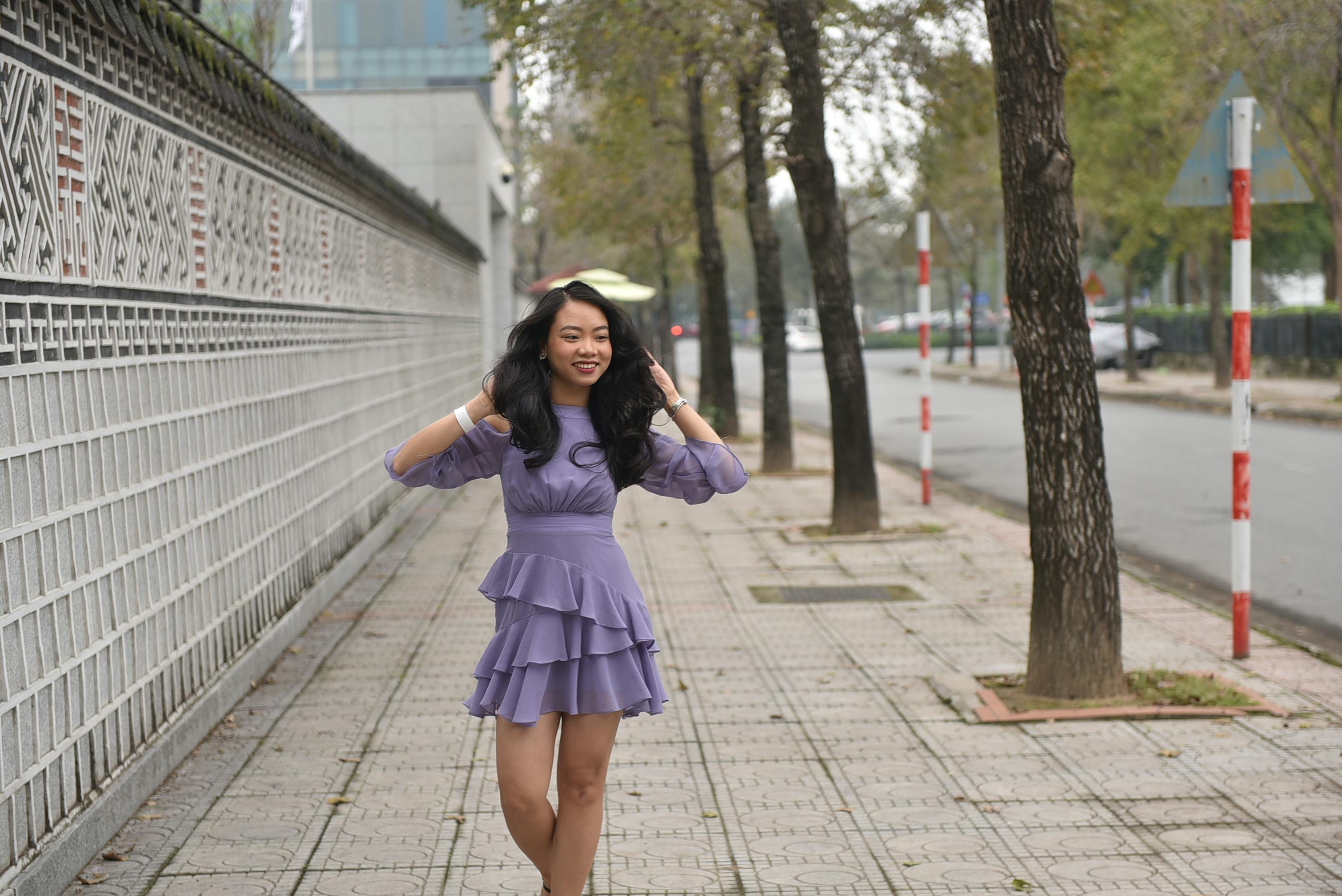Woman Wearing Purple Dress Walking on a Street · Free Stock Photo
