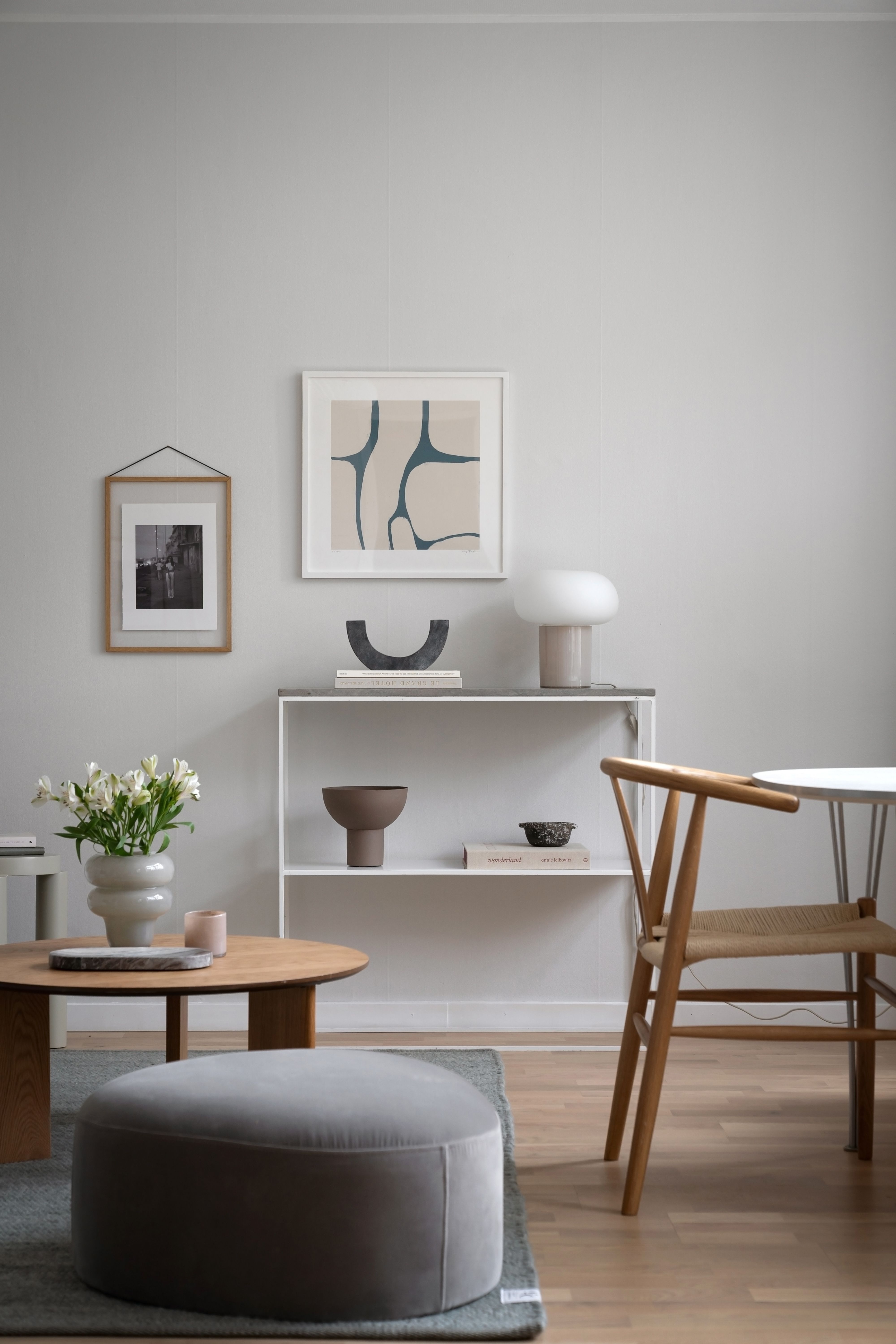 A Soft, Light Colored Sofa and a Wooden Chair in a Modern Living Room ...