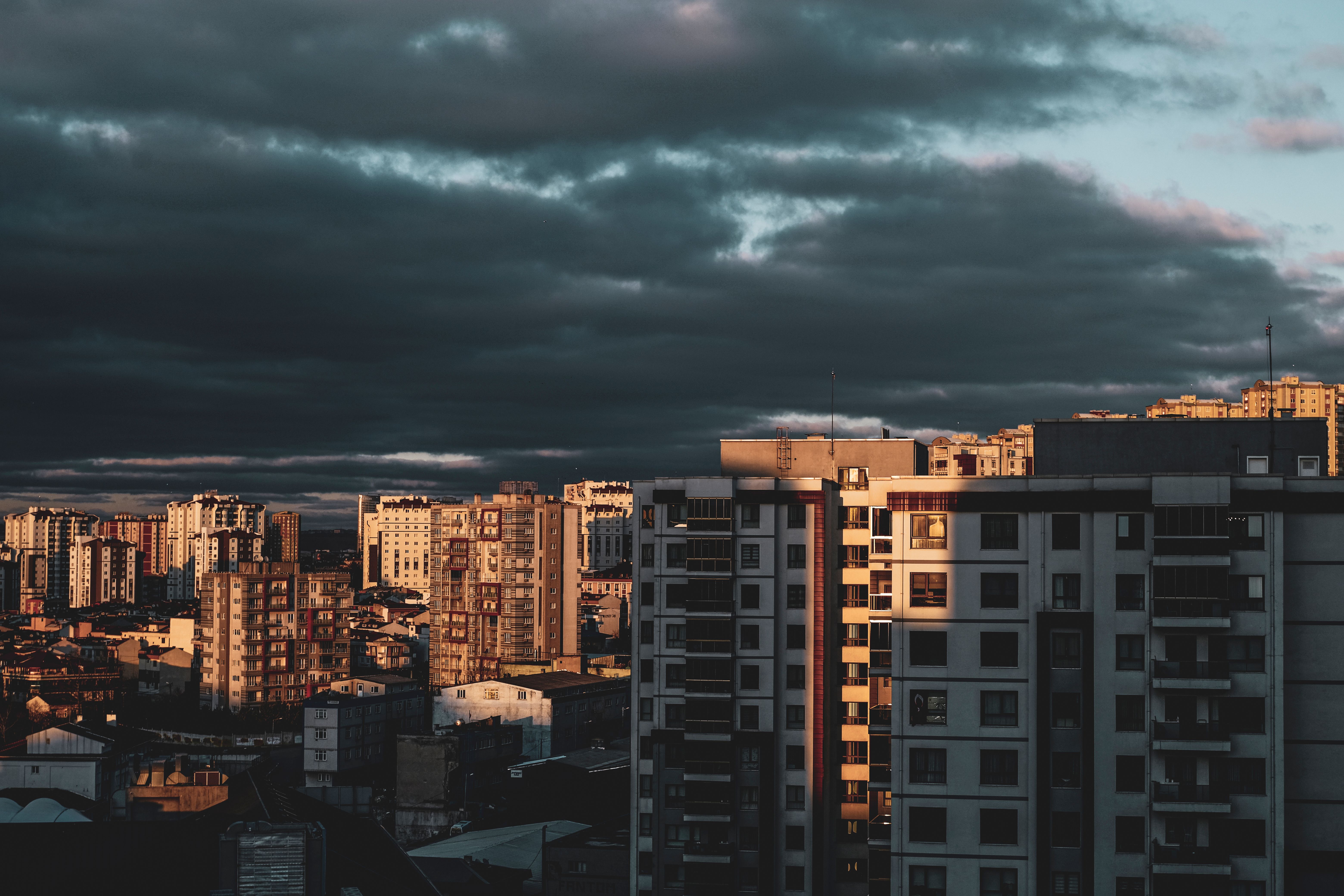 Rain Cloud over Residential Buildings in City · Free Stock Photo