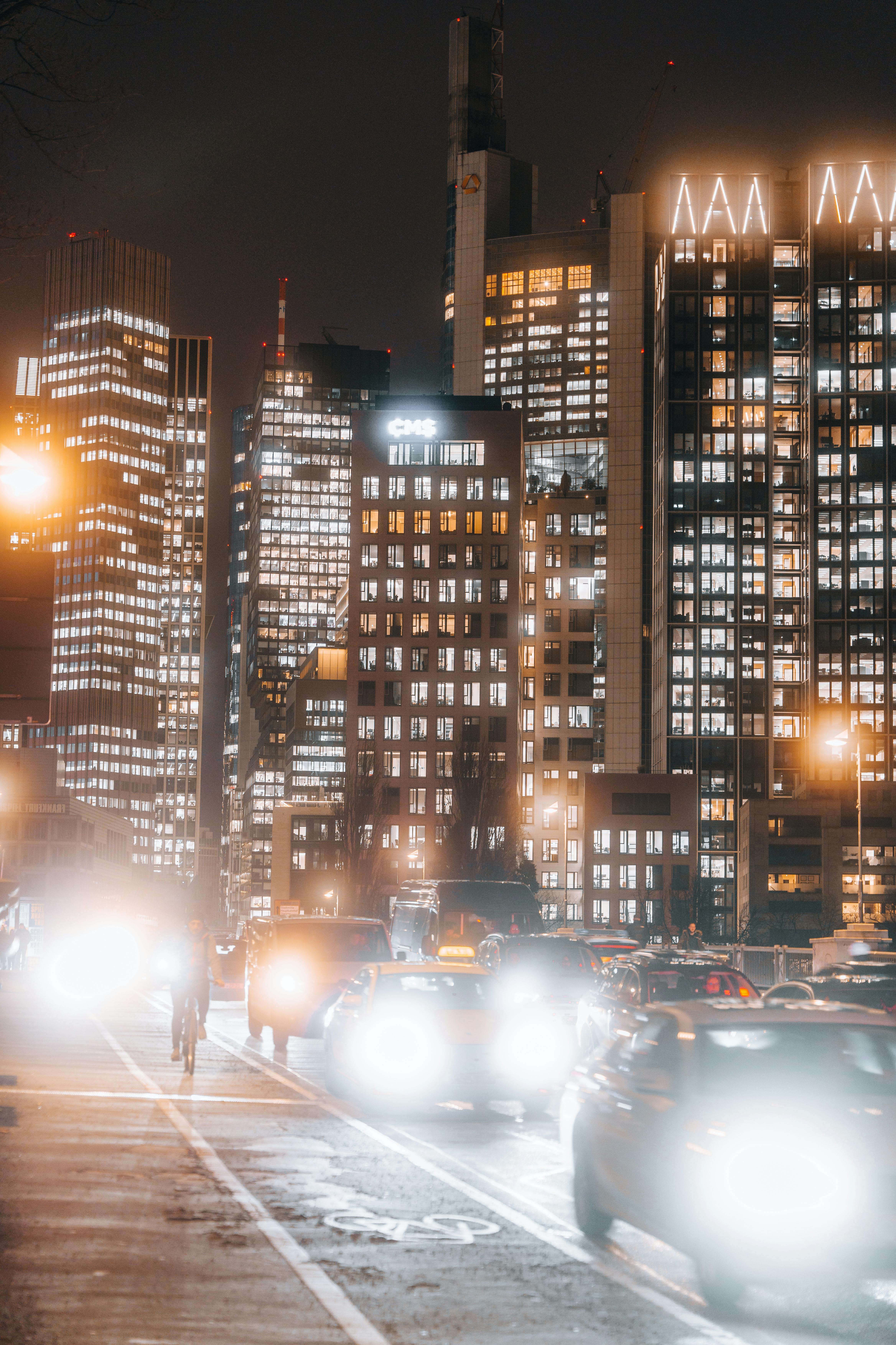 High Rise City Building during Night Time Photo · Free Stock Photo