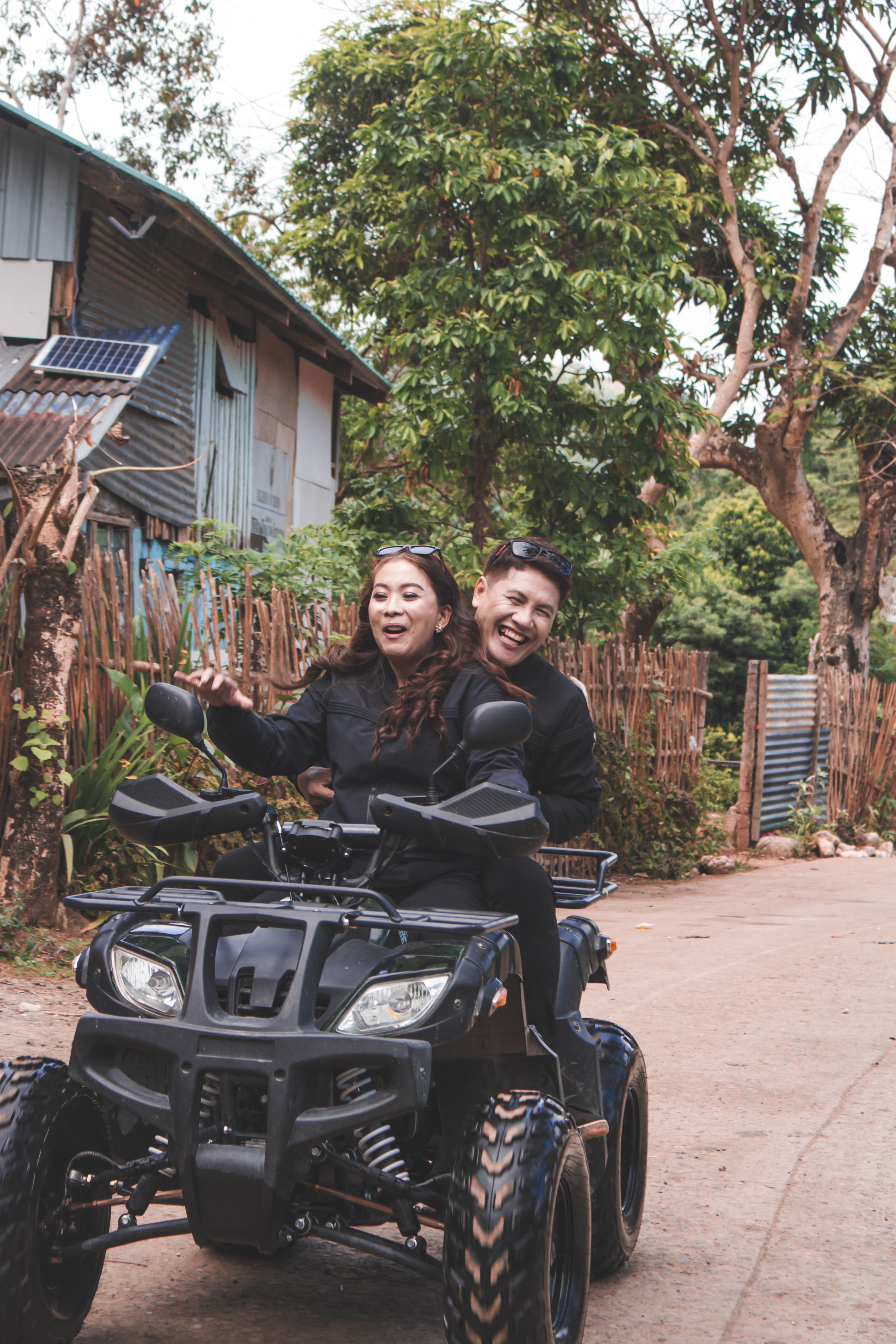 Couple on a Quad Bike · Free Stock Photo