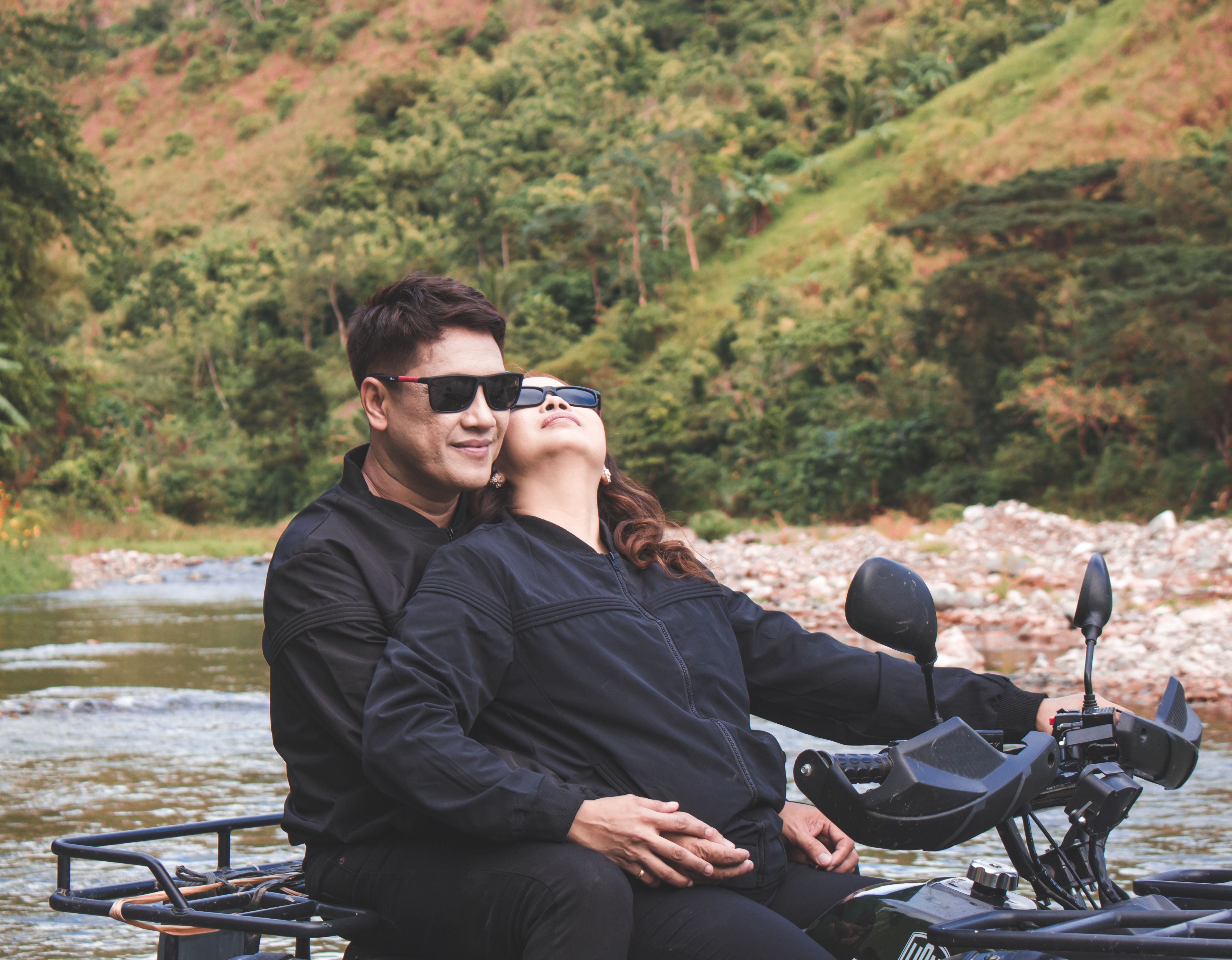 Couple Sitting on ATV Standing in the River · Free Stock Photo