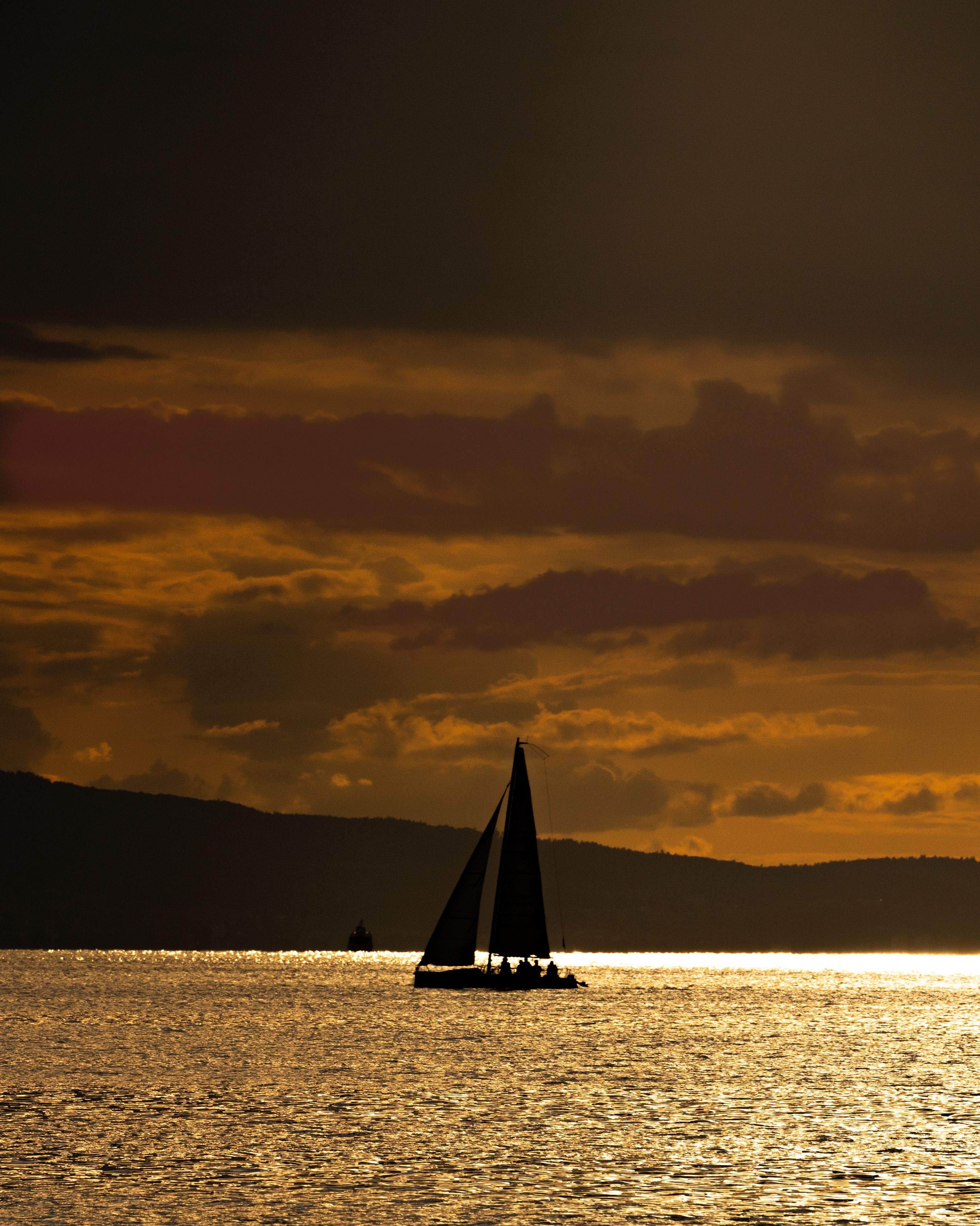 Sailboat under Rain Cloud on Lake · Free Stock Photo