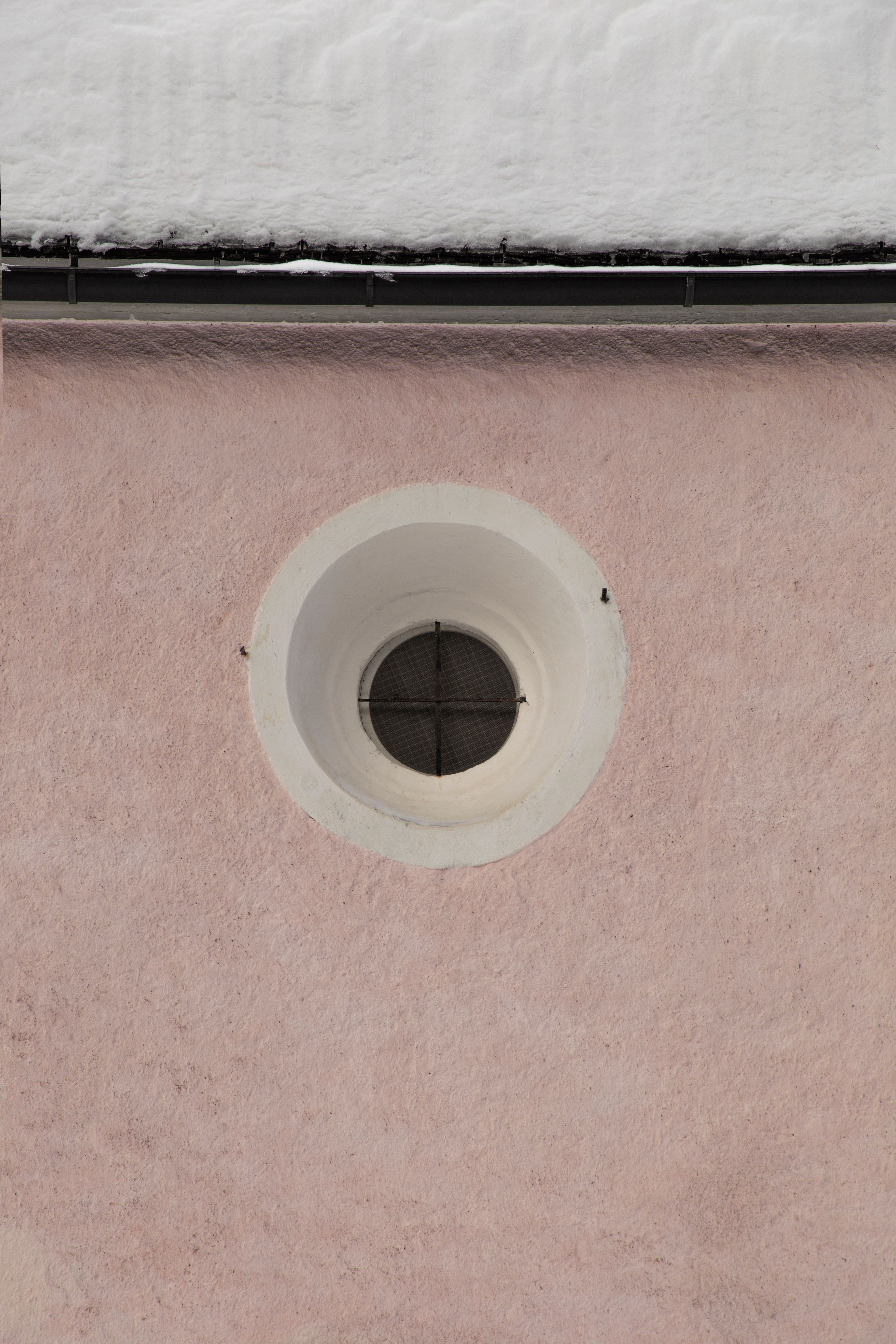 Small, Round Window on House Wall · Free Stock Photo