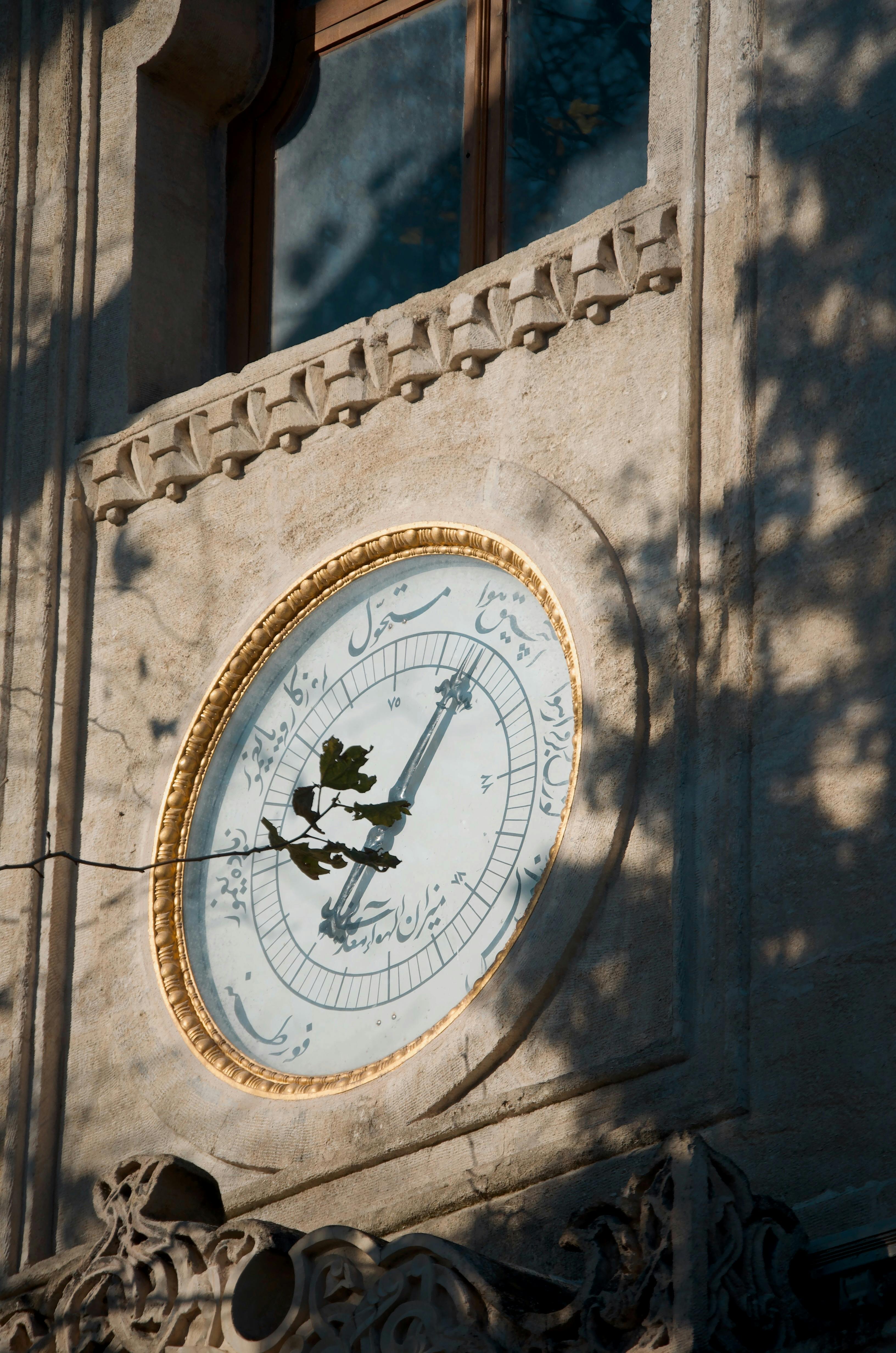 Clock on Building Wall · Free Stock Photo