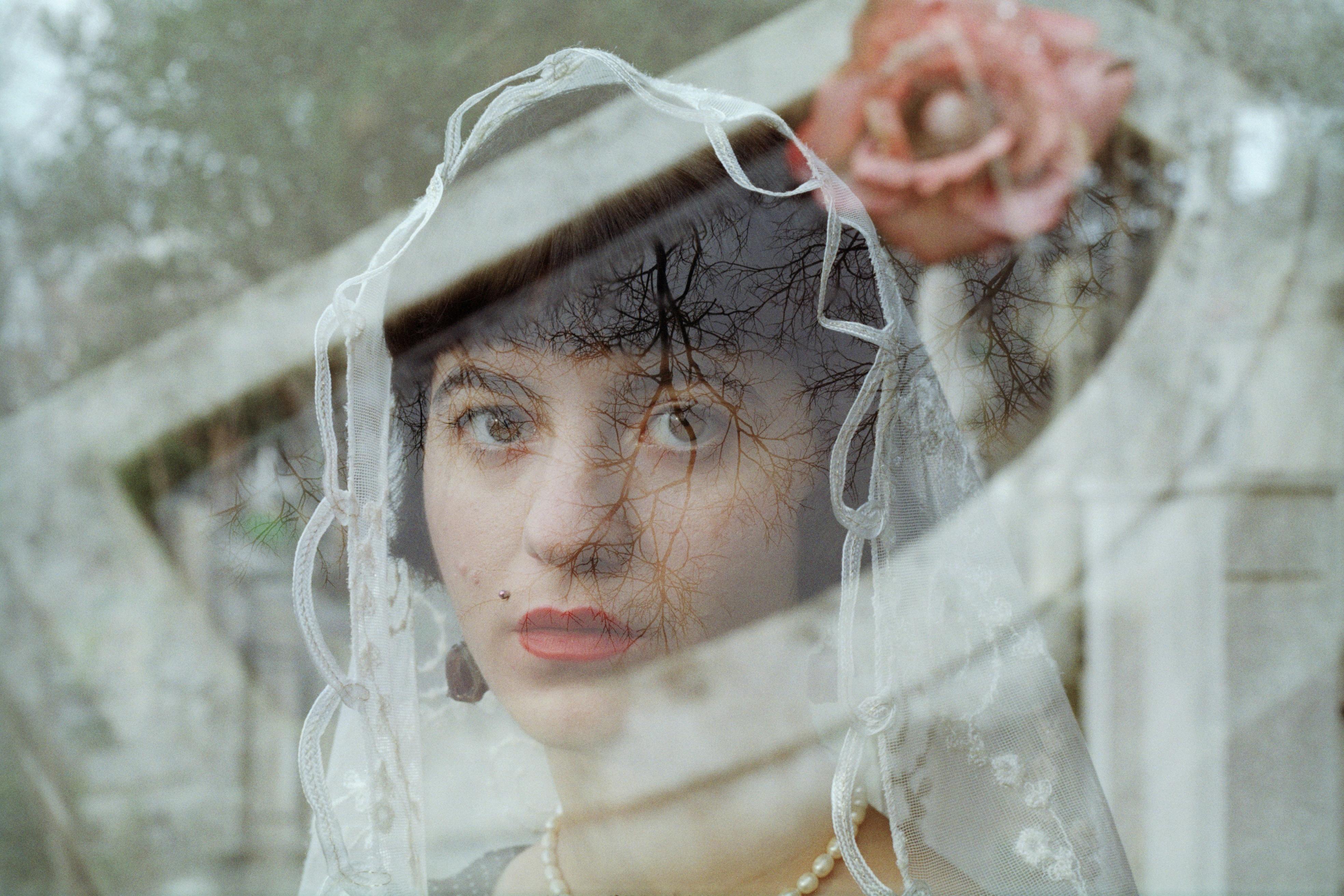 Reflection on a Woman in a Lace Veil · Free Stock Photo