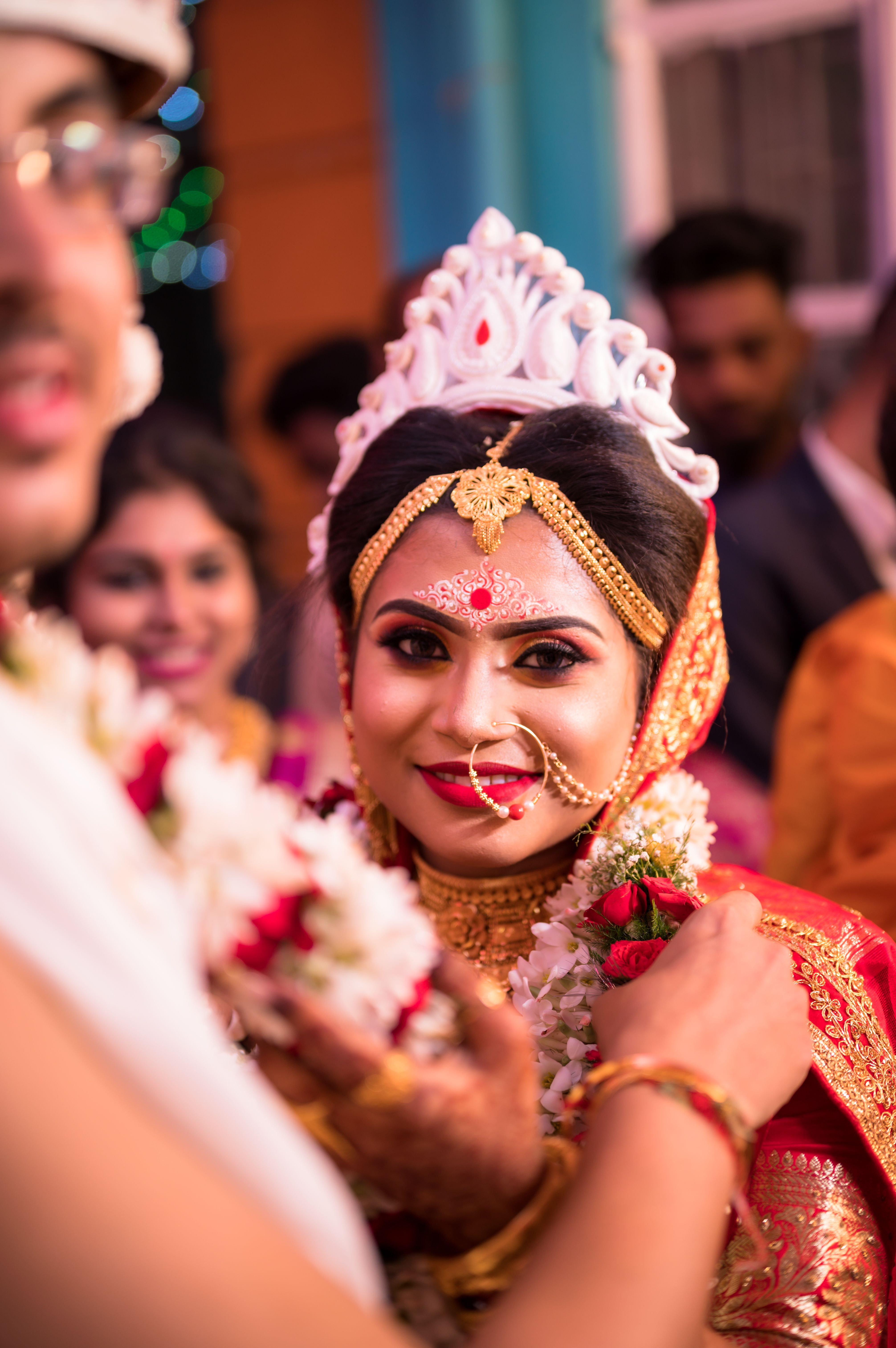 Smiling Bride in Traditional Clothing · Free Stock Photo