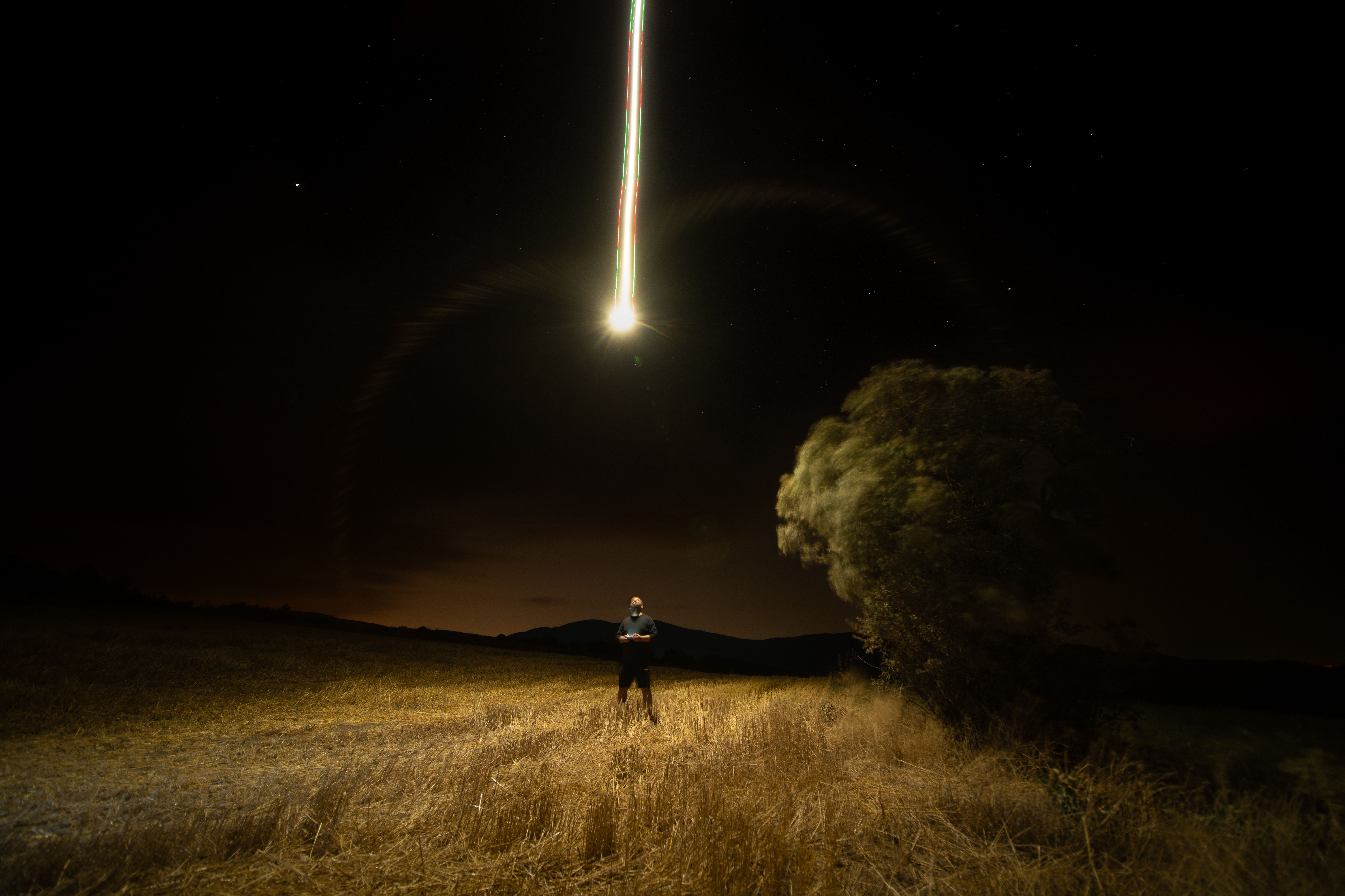 Falling Star over Man at Night · Free Stock Photo