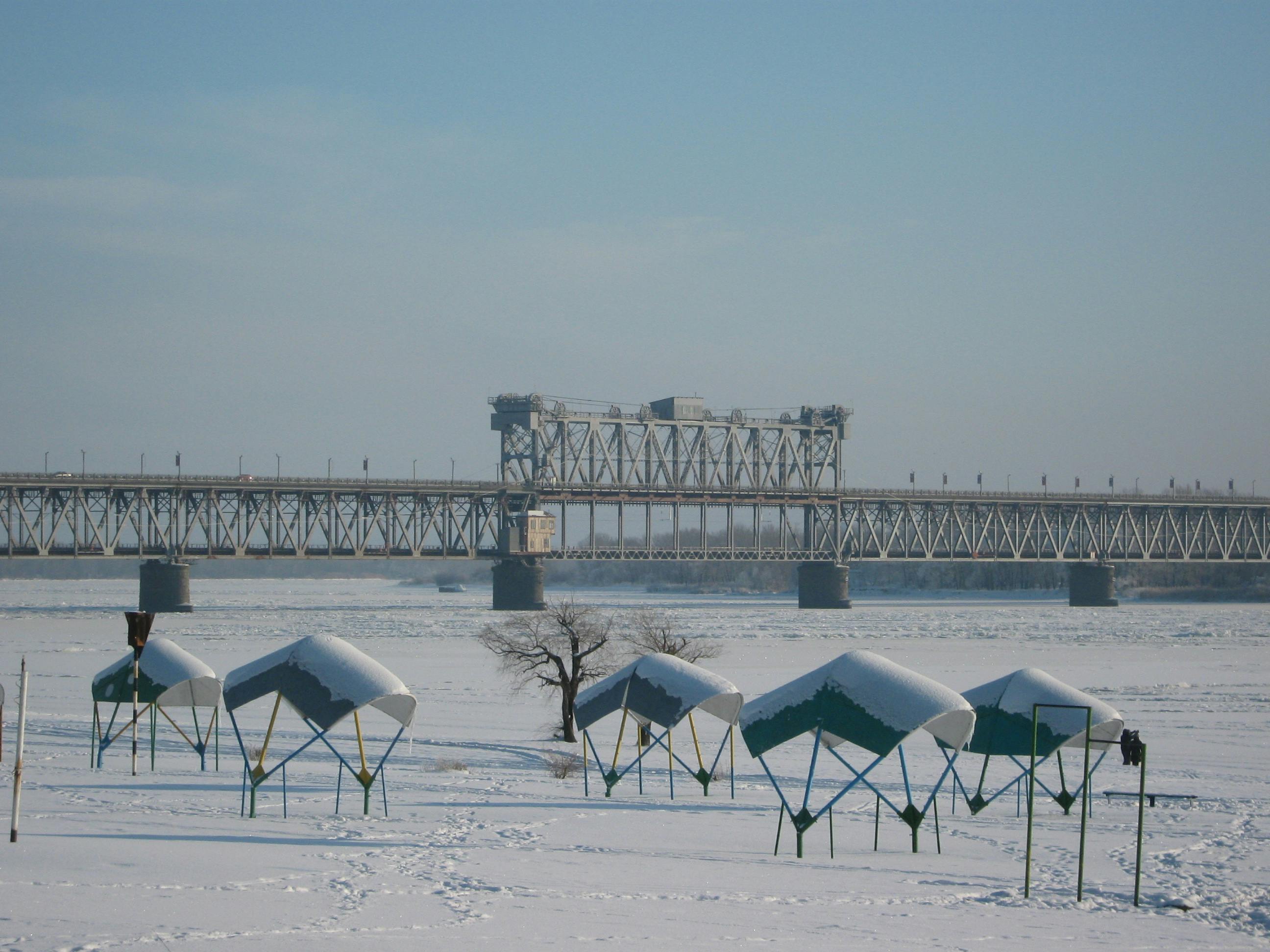 View of a Snowy Field and the Kryukov Bridge in Kremenchuk, Ukraine ...