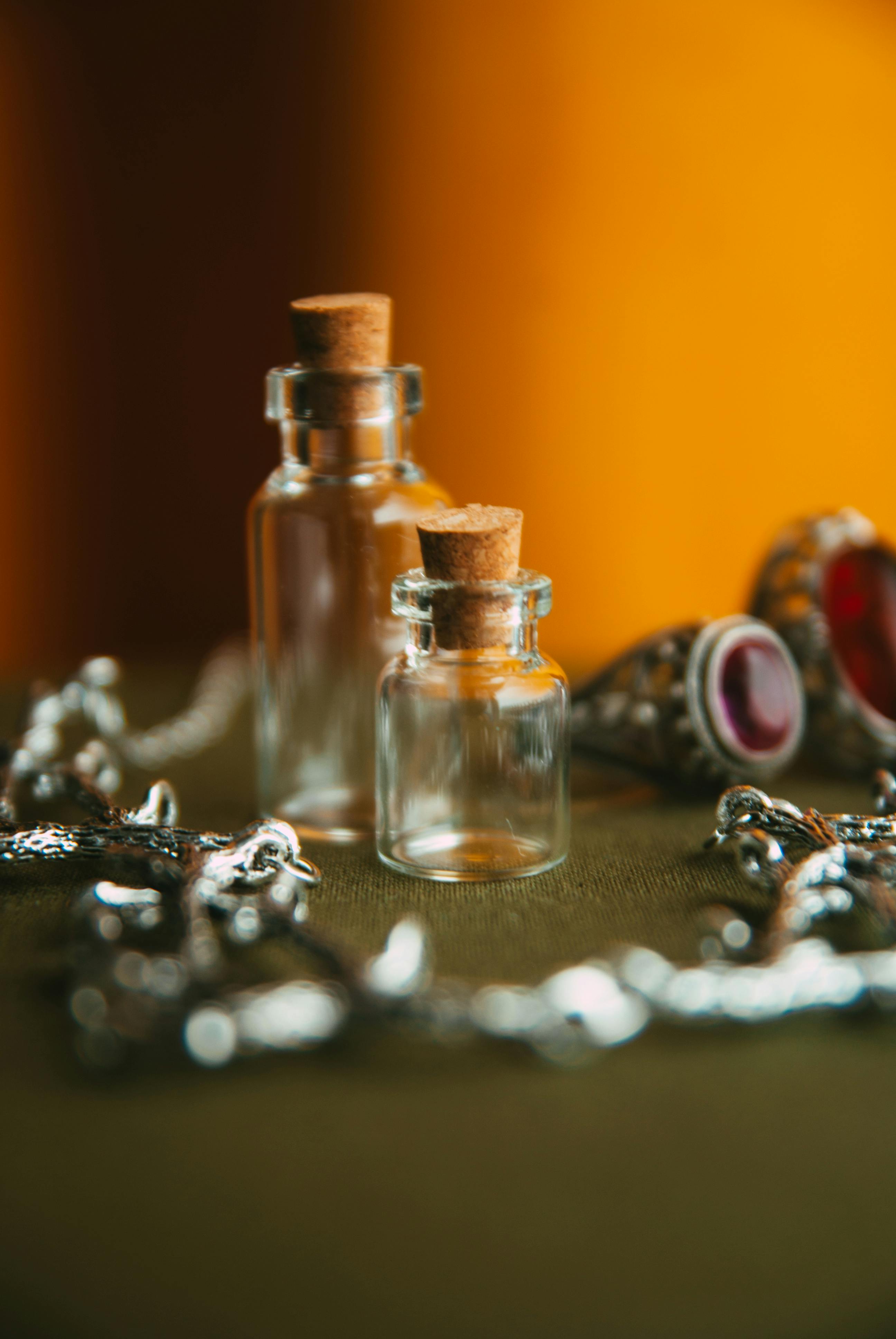Glass Vials and Jewelry · Free Stock Photo