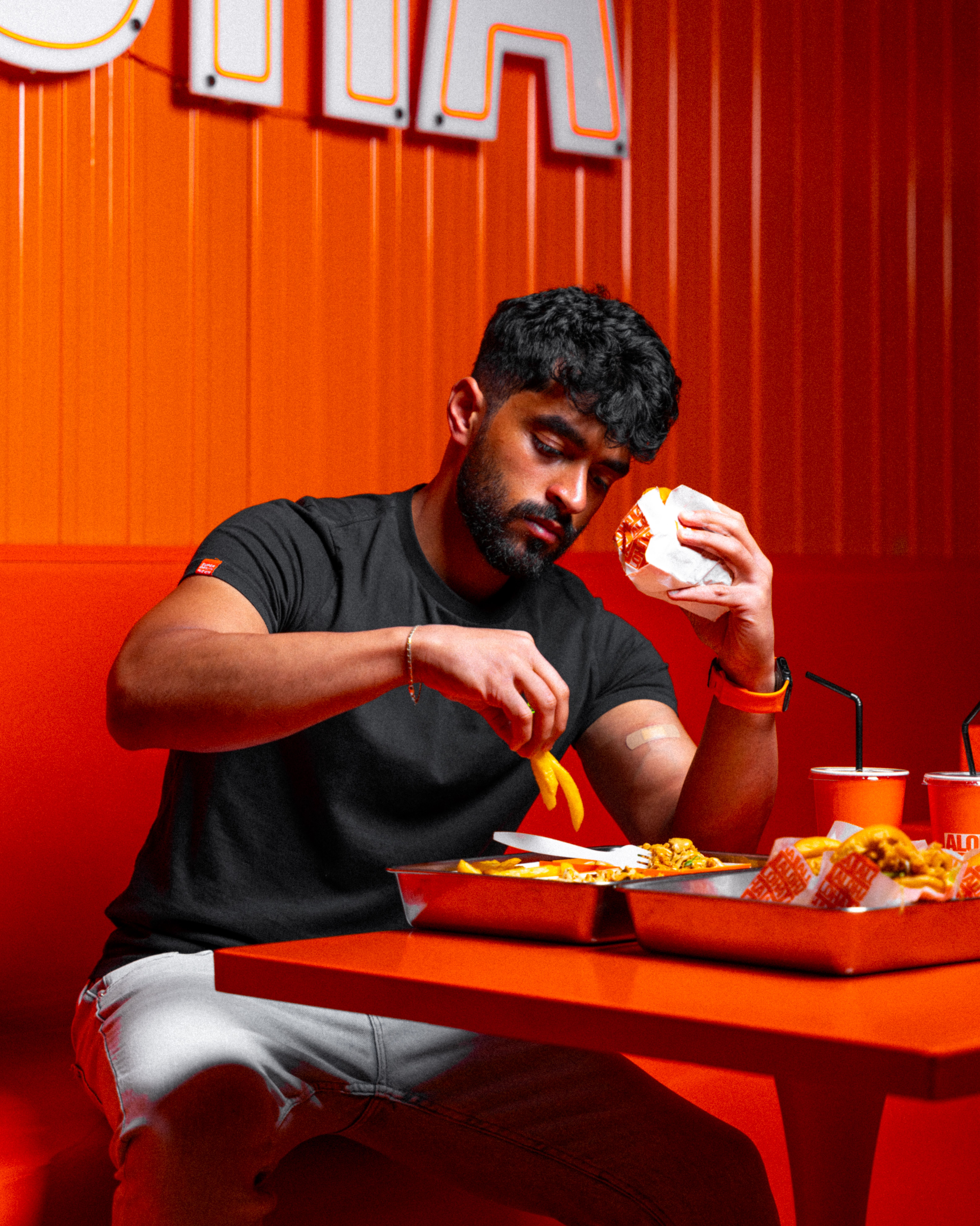 Man is Eating Street Food in Restaurant · Free Stock Photo