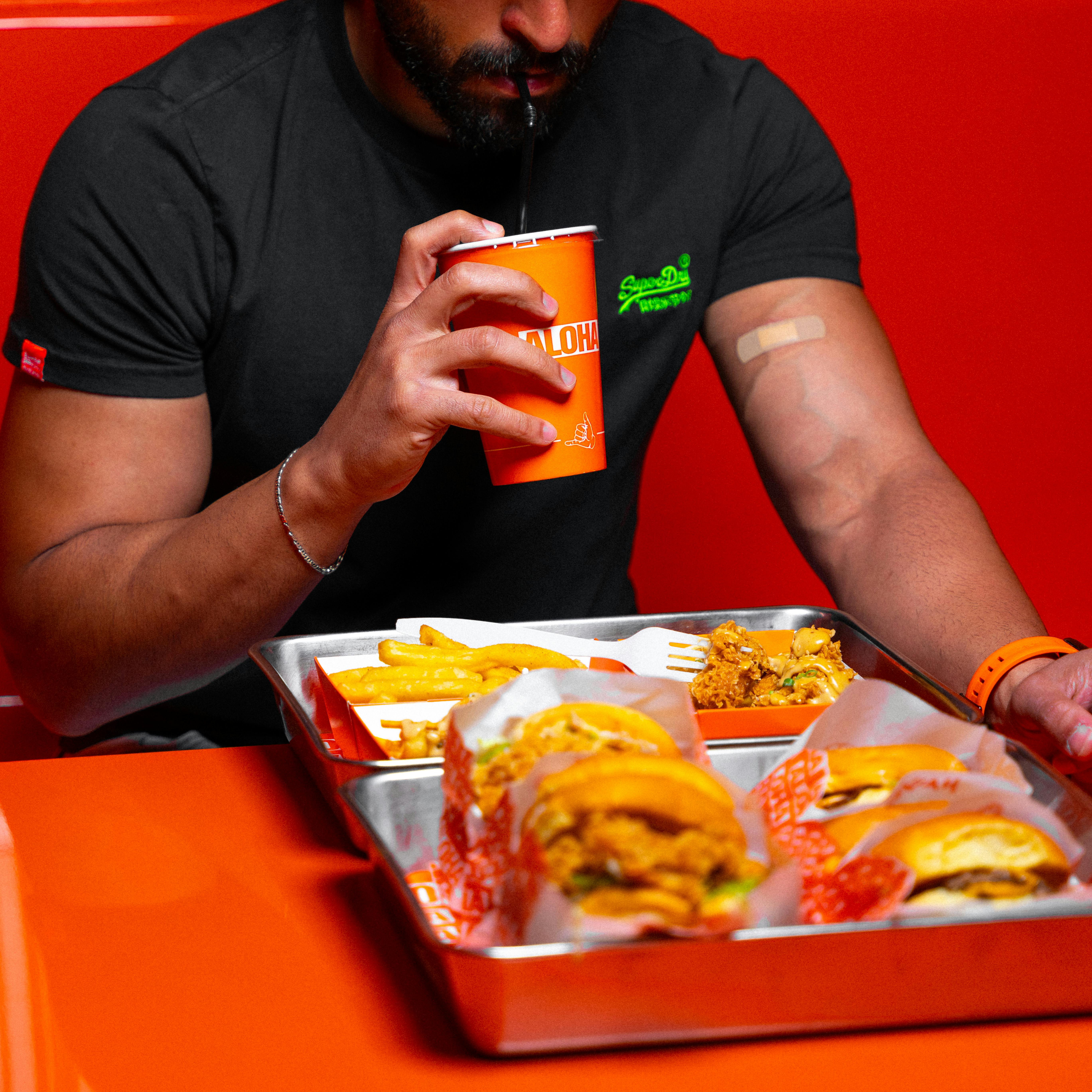 Man Eating Fast Food · Free Stock Photo