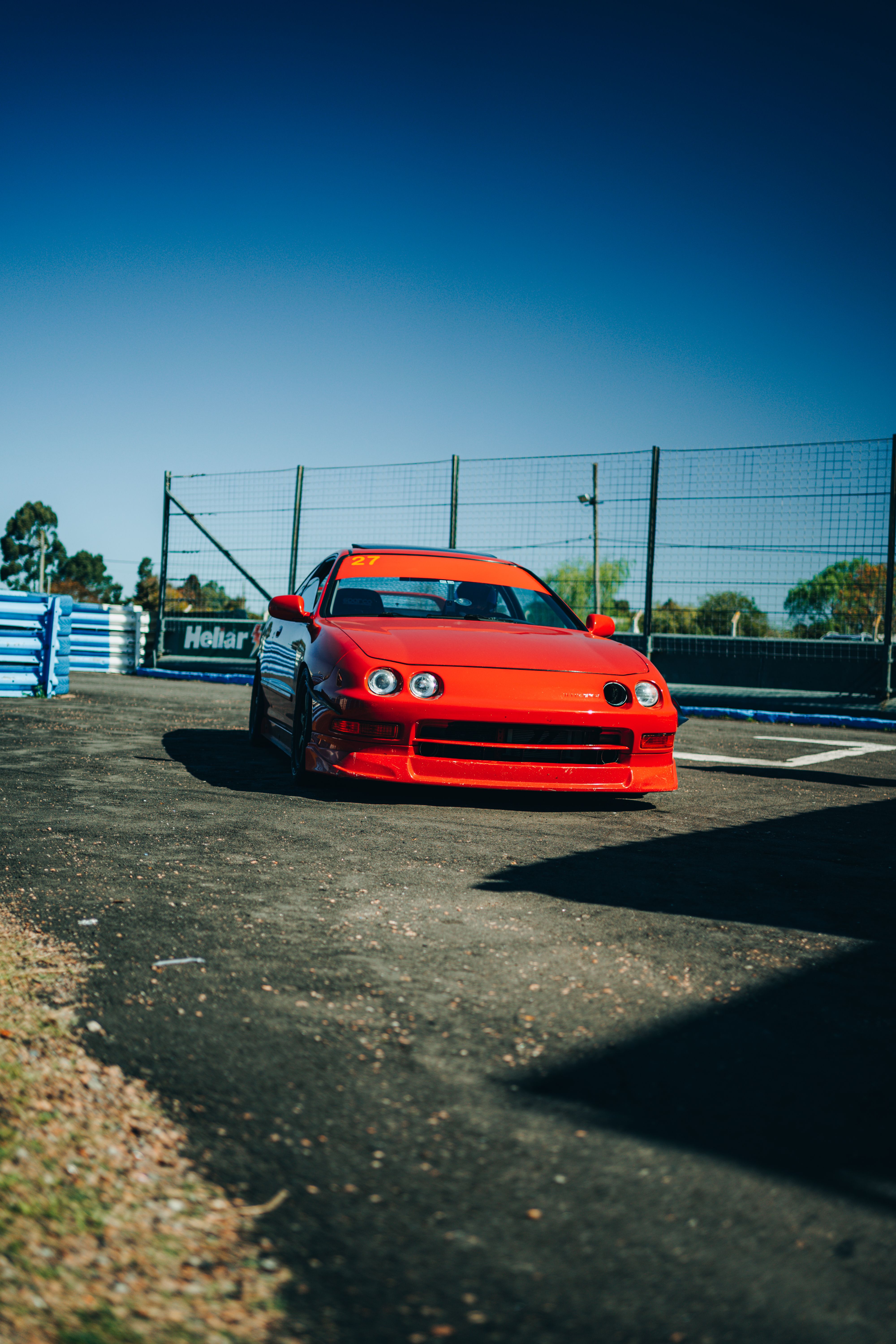 Red Car on a Track · Free Stock Photo
