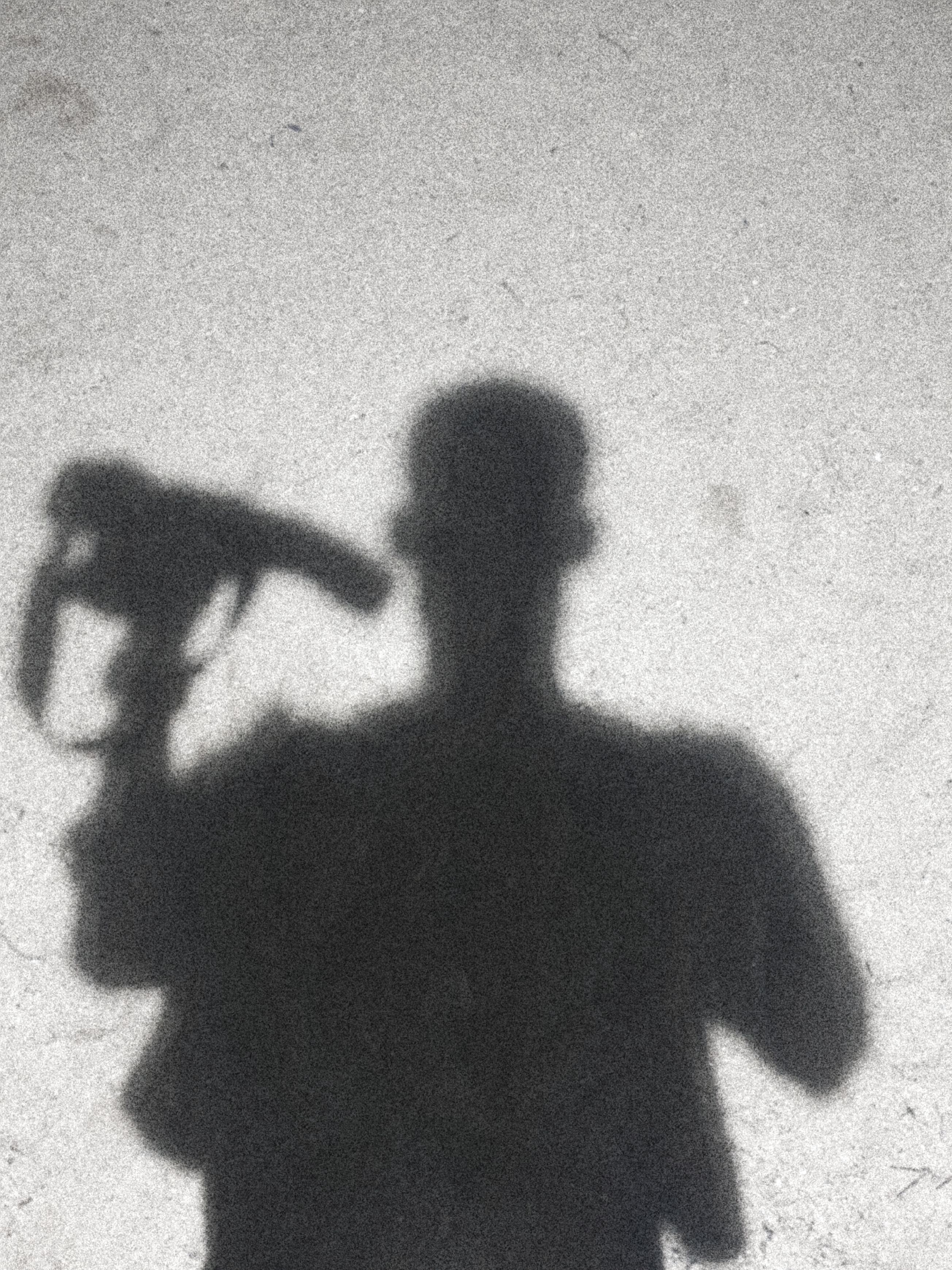 Shadow of Man with Camera on Ground · Free Stock Photo