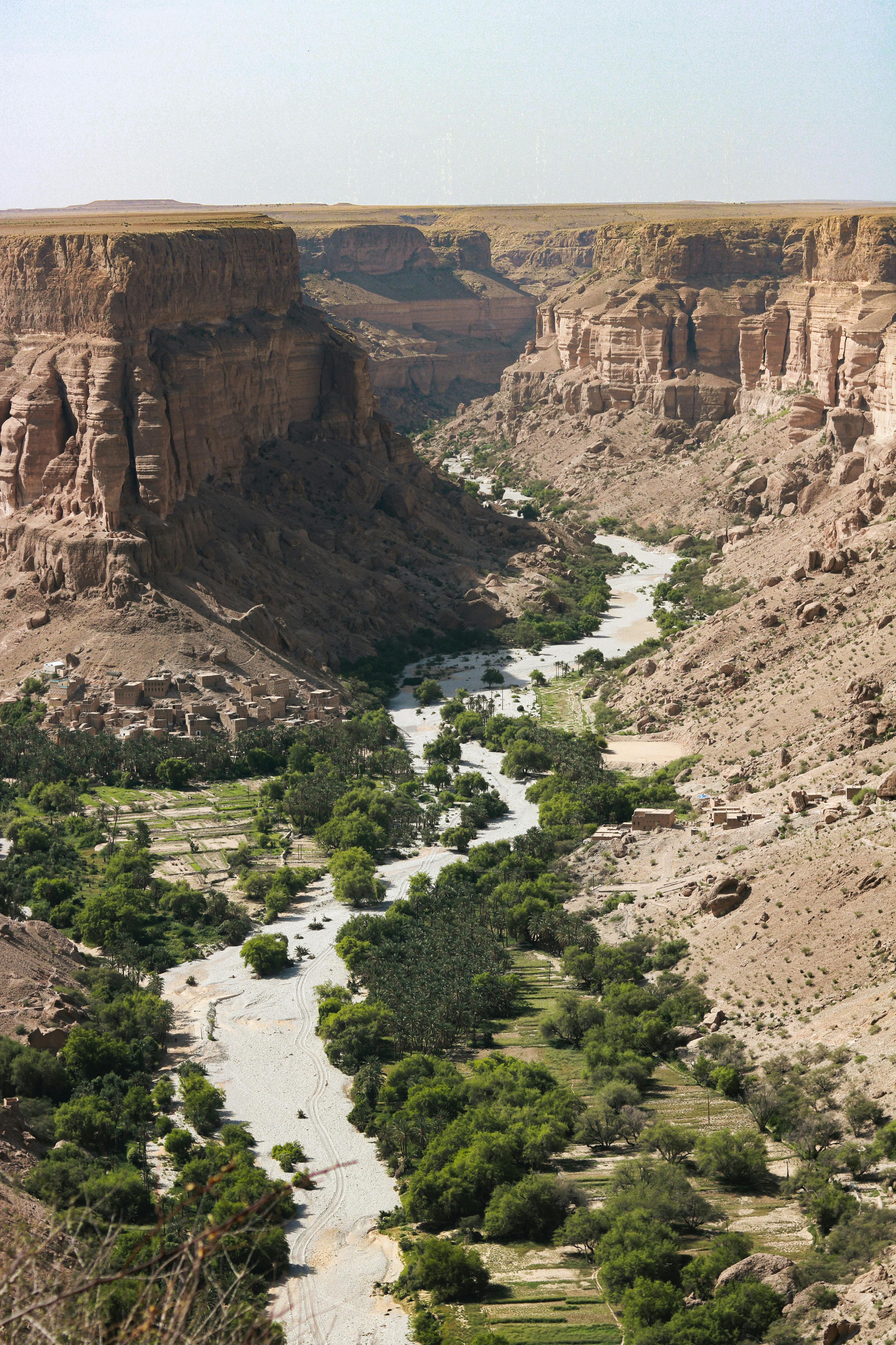 villages and trees below the valley · Free Stock Photo