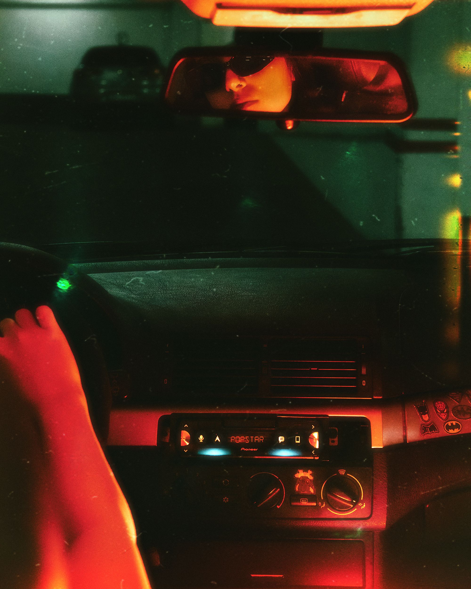 Driver in Sunglasses Reflection in Mirror in Car · Free Stock Photo