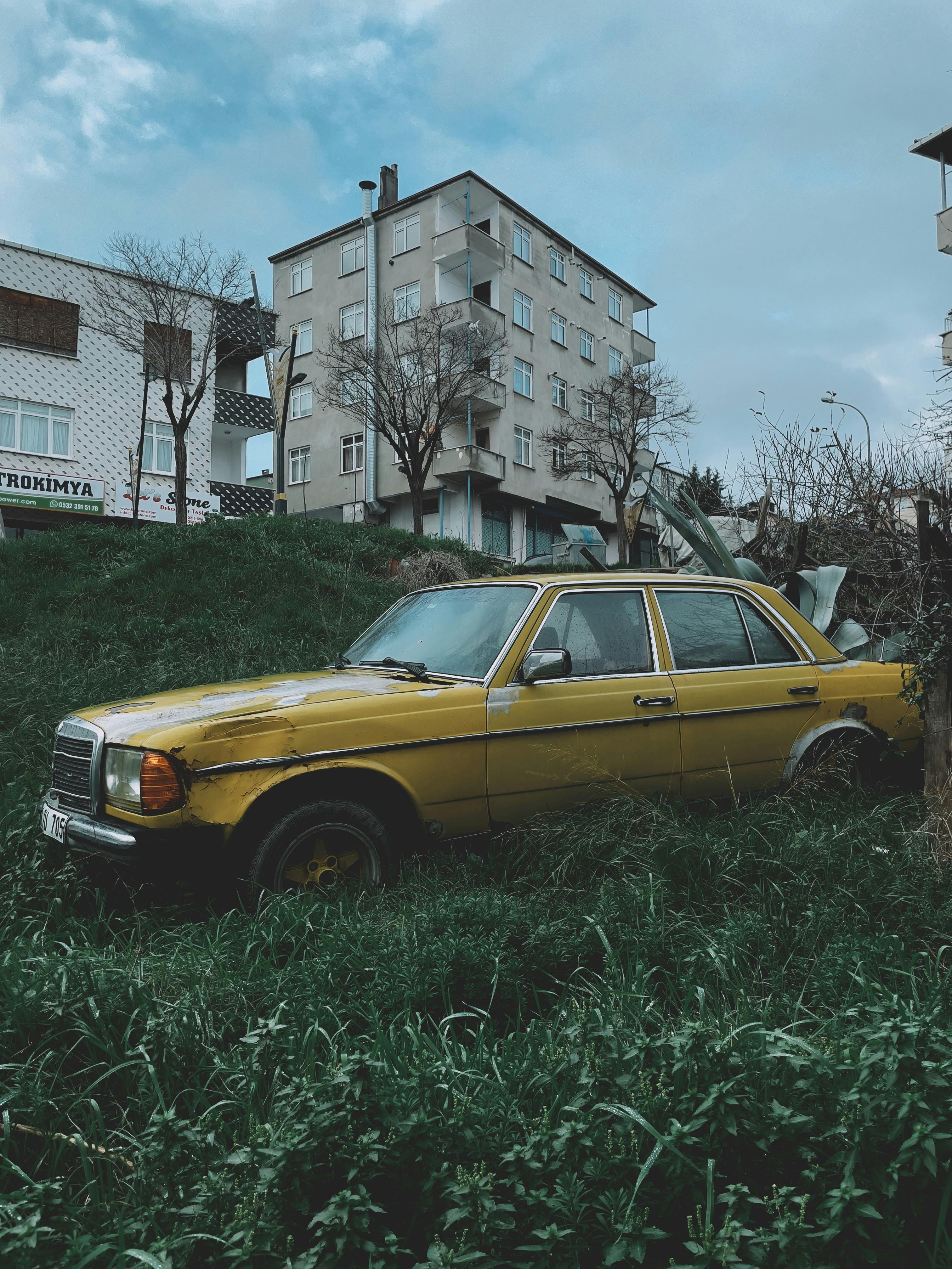 Rusty Yellow Cars on the Road · Free Stock Photo