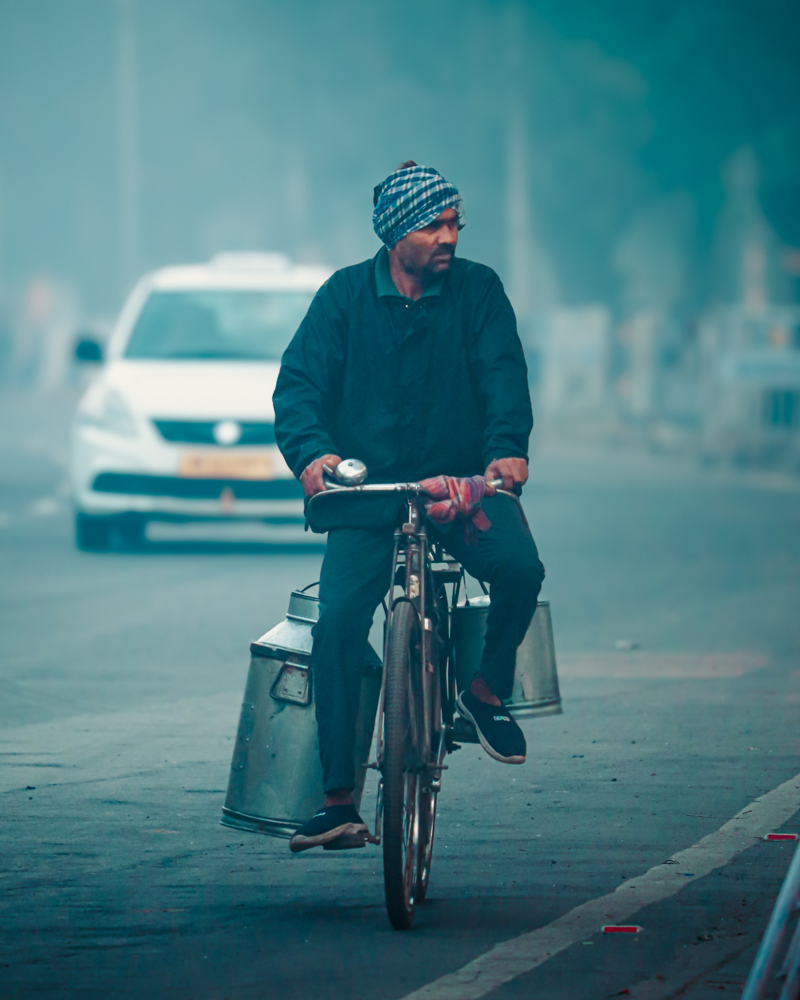 Man Riding Bike with Bottles · Free Stock Photo