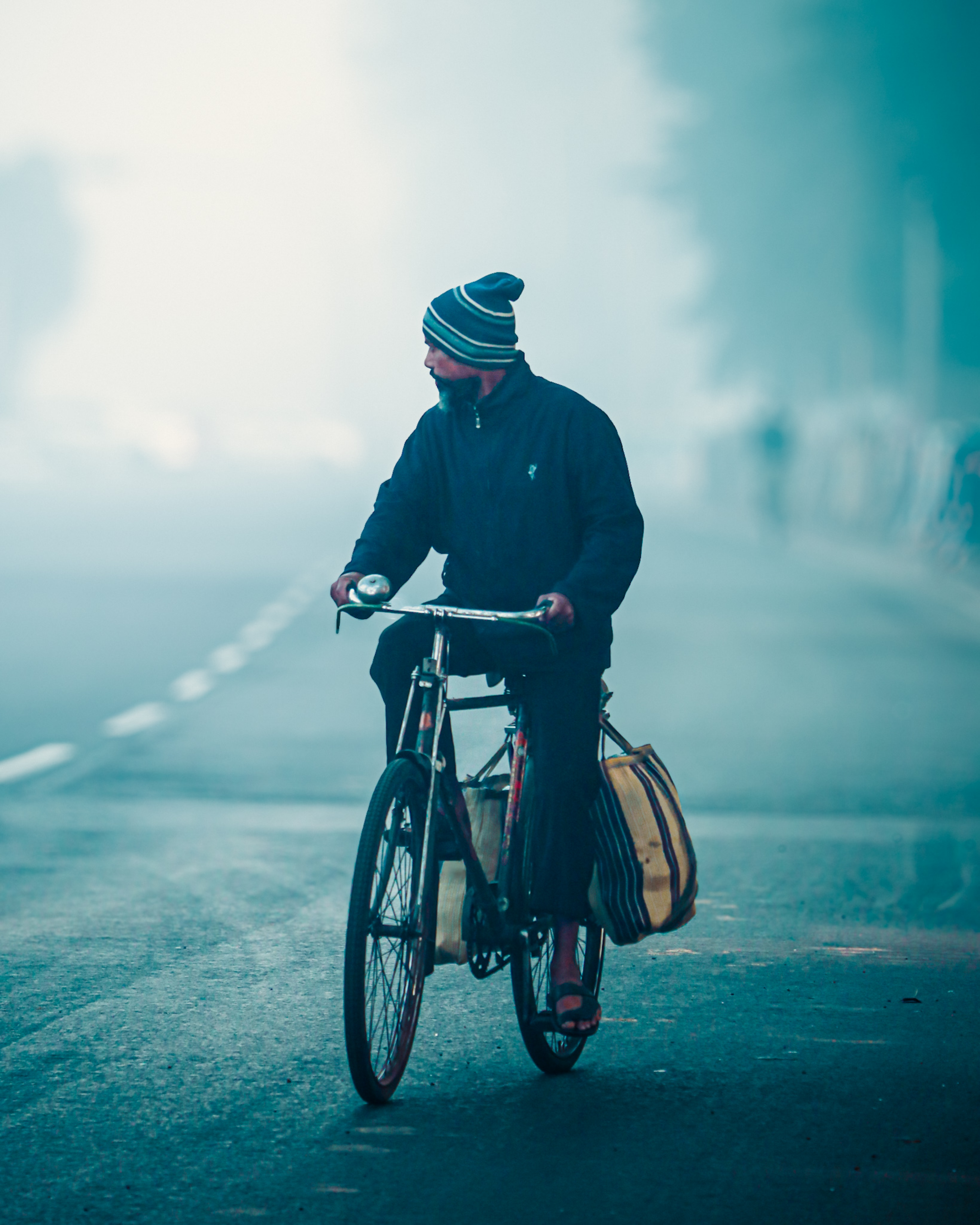 Man Riding Bike with Bottles · Free Stock Photo
