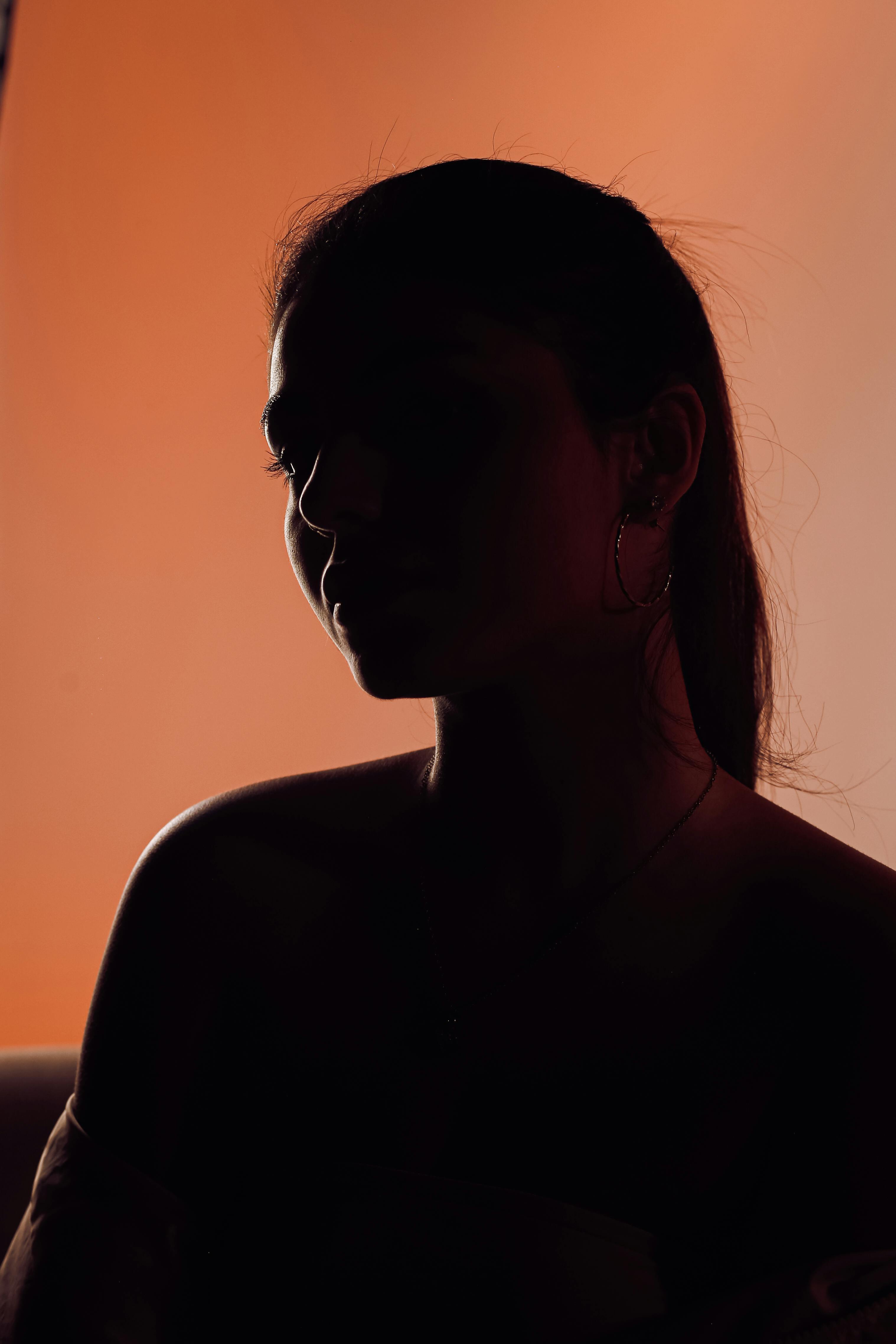 Portrait of Woman Under Red Light · Free Stock Photo