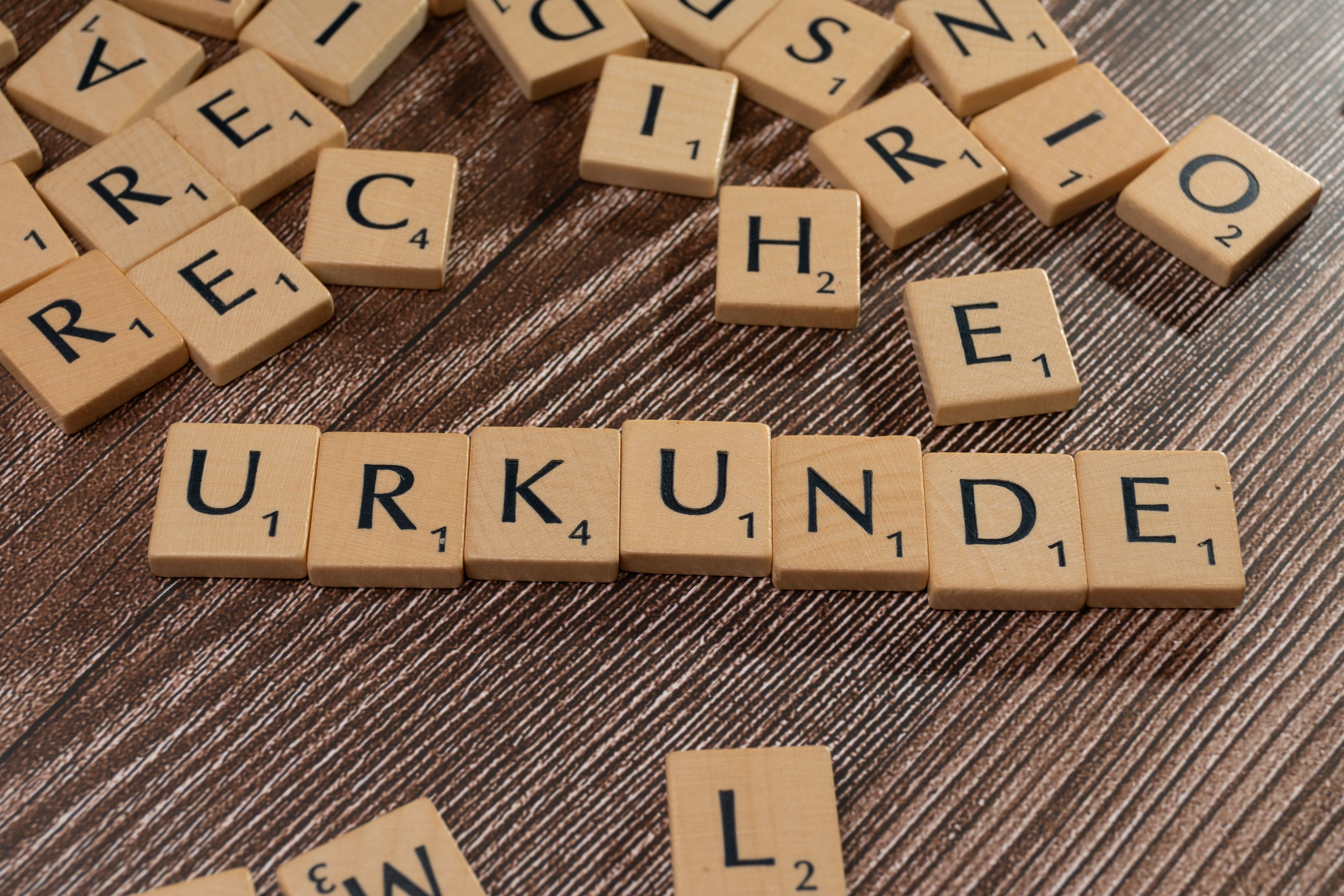 Pile of Scrabble Letter Pieces · Free Stock Photo