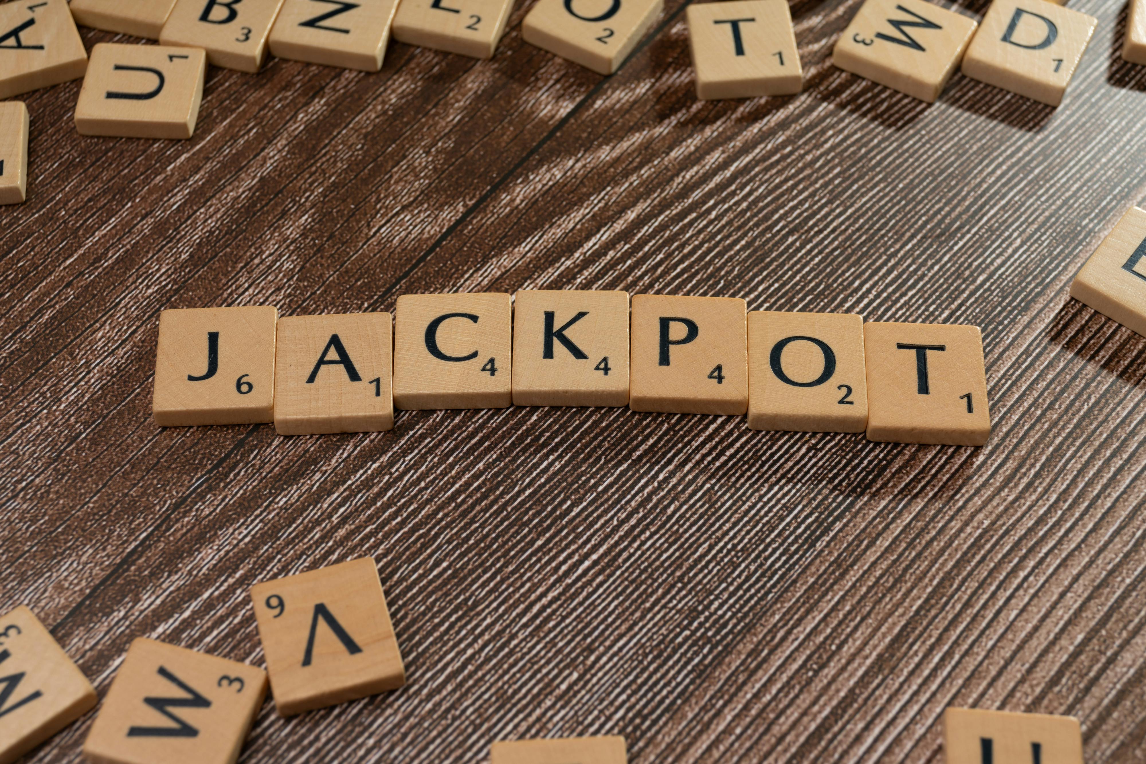 The word jackpot spelled out in scrabble letters · Free Stock Photo
