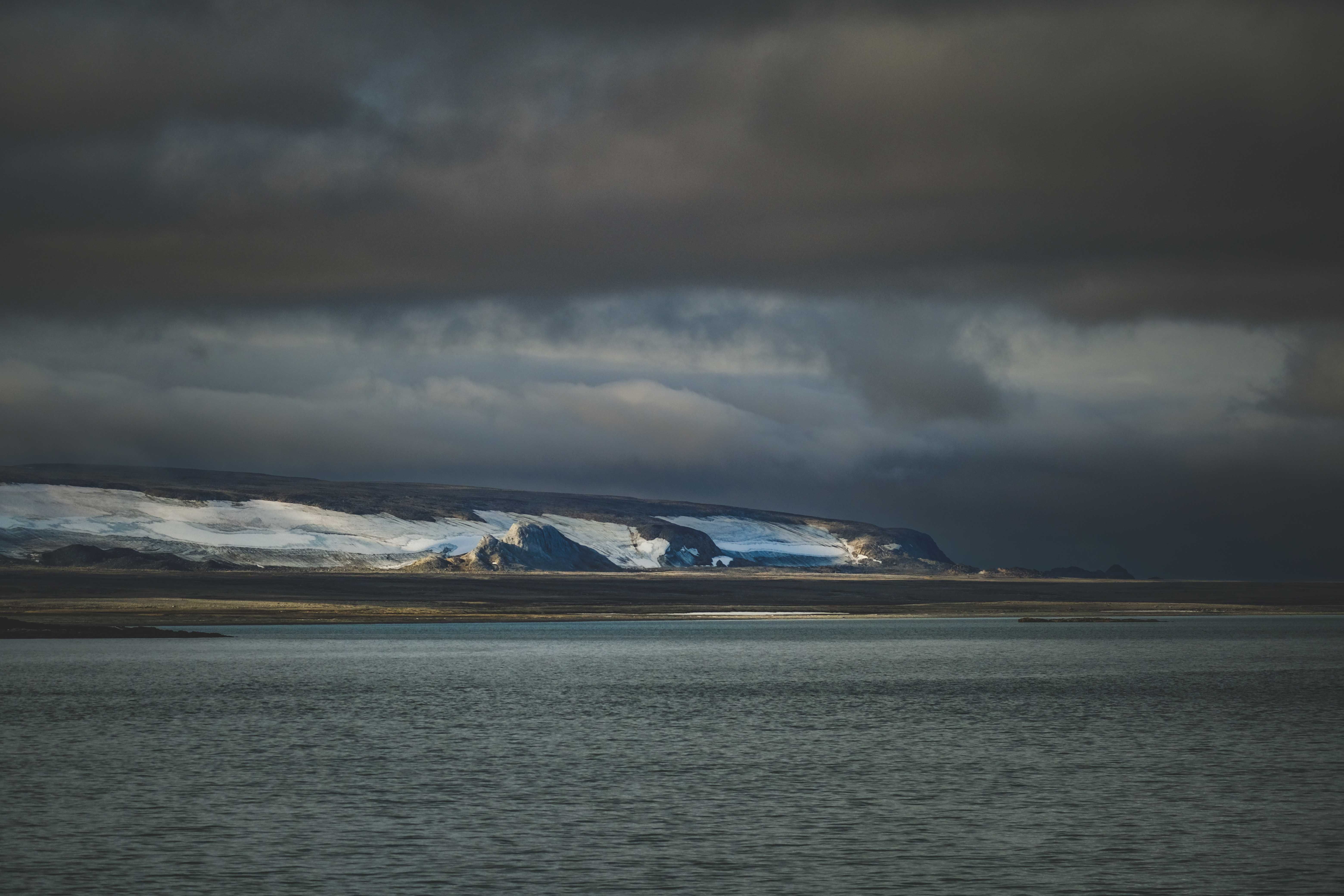 Rain Cloud over Sea Coast in Winter · Free Stock Photo