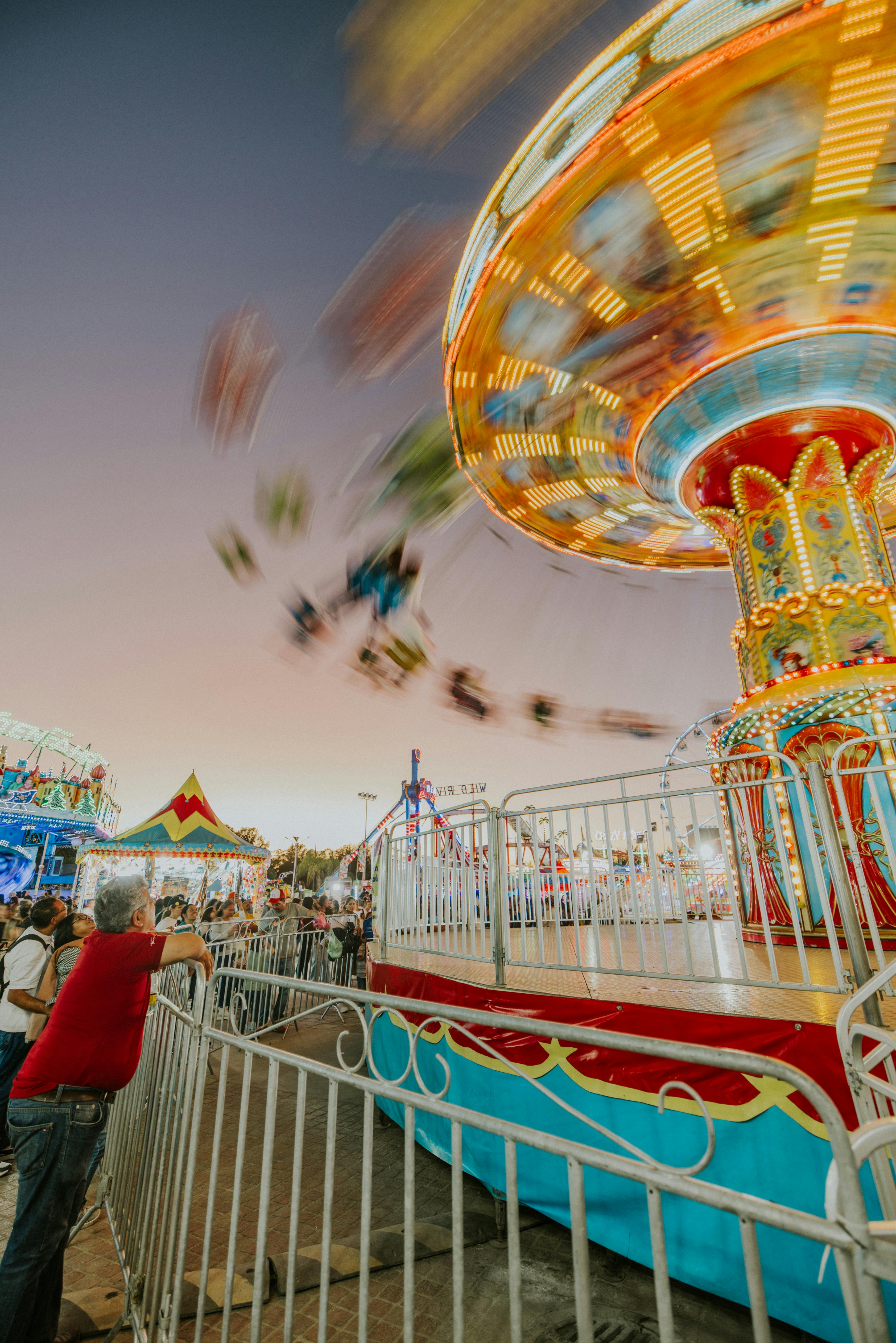 Blurred Motion of a Spinning Chain Swing Ride · Free Stock Photo