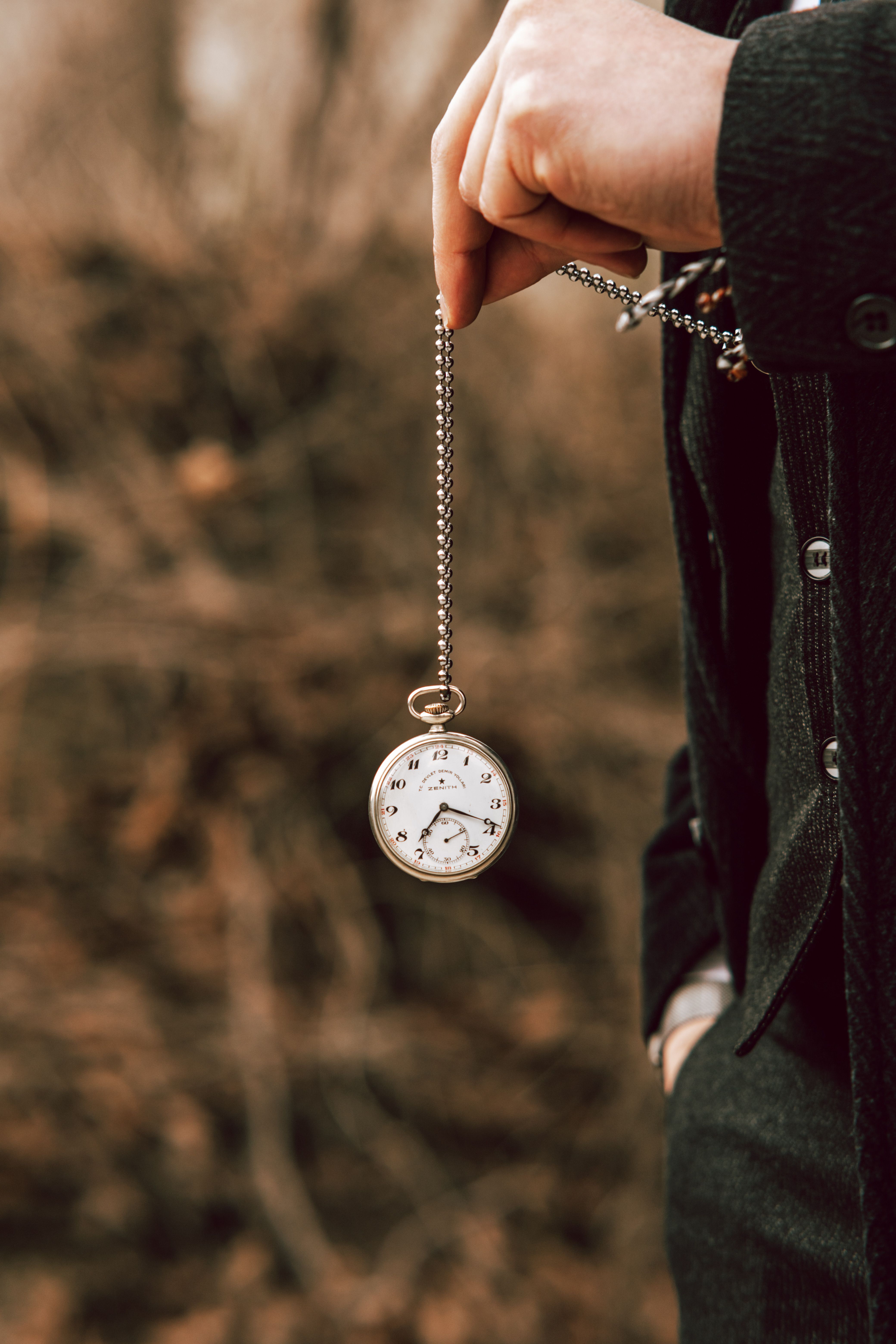 Man in Suit with Pocket Watch · Free Stock Photo