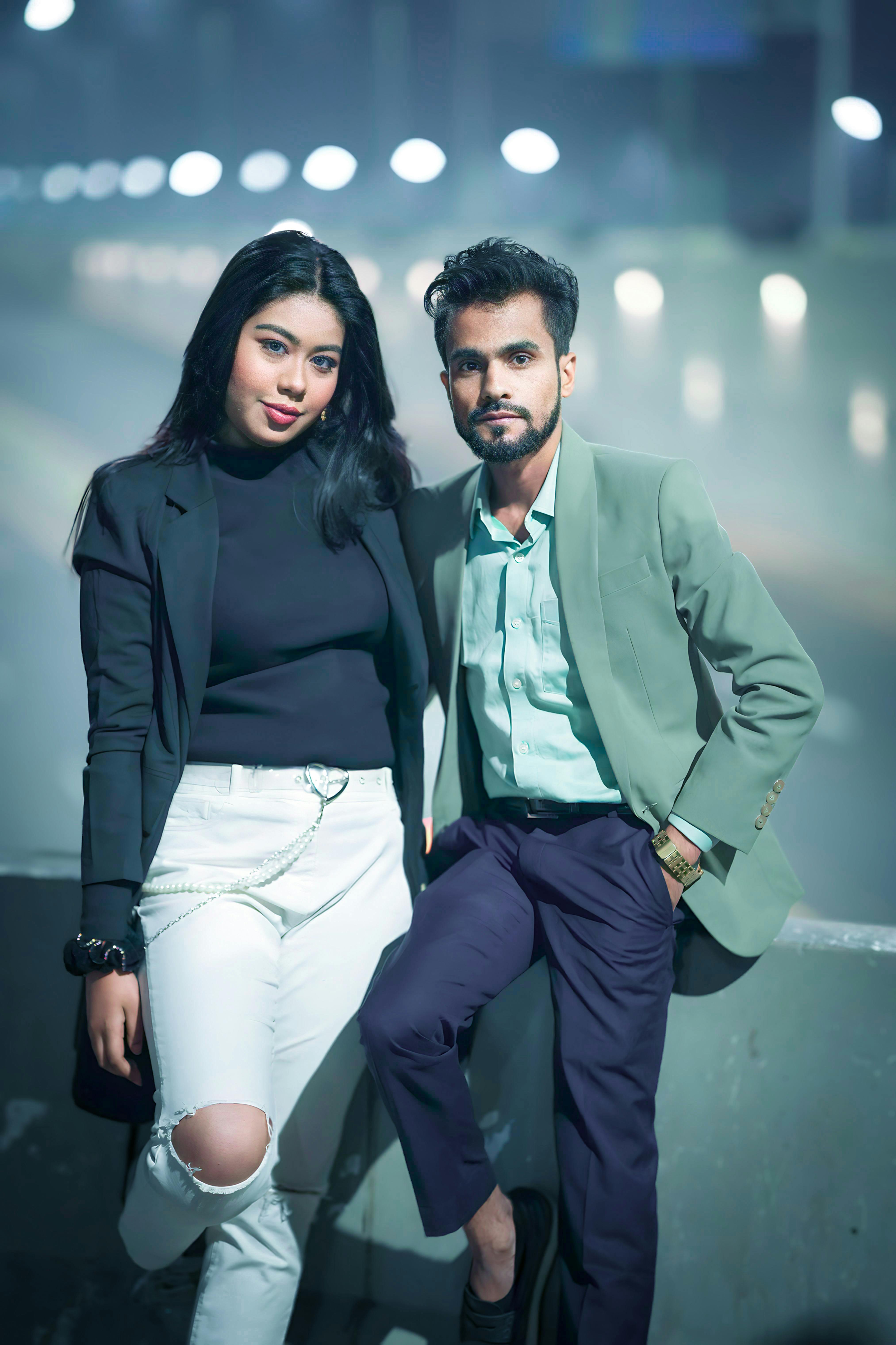 Male and a Female Model Posing Together Outdoors · Free Stock Photo