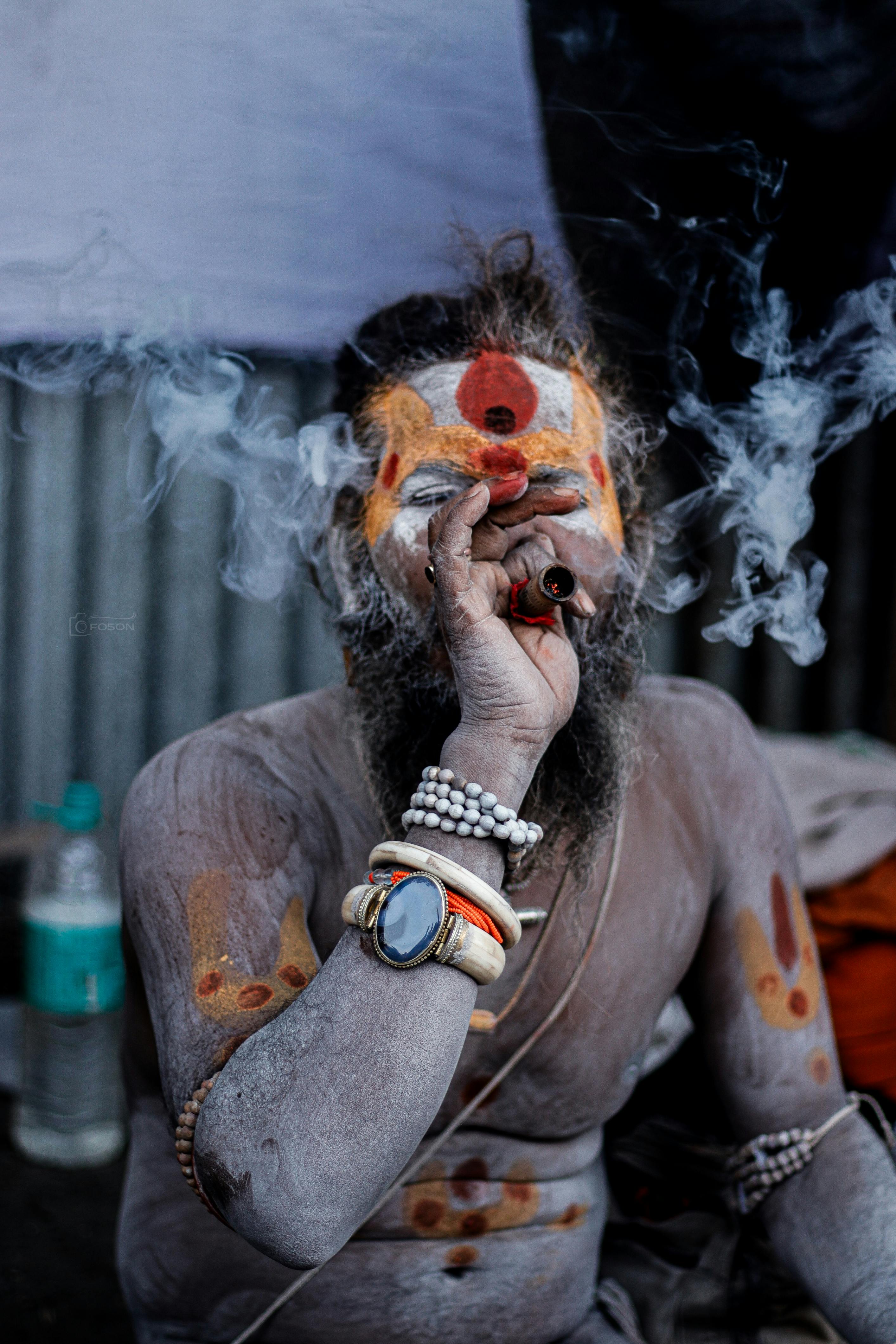 Portrait of Tribal Man Smoking · Free Stock Photo