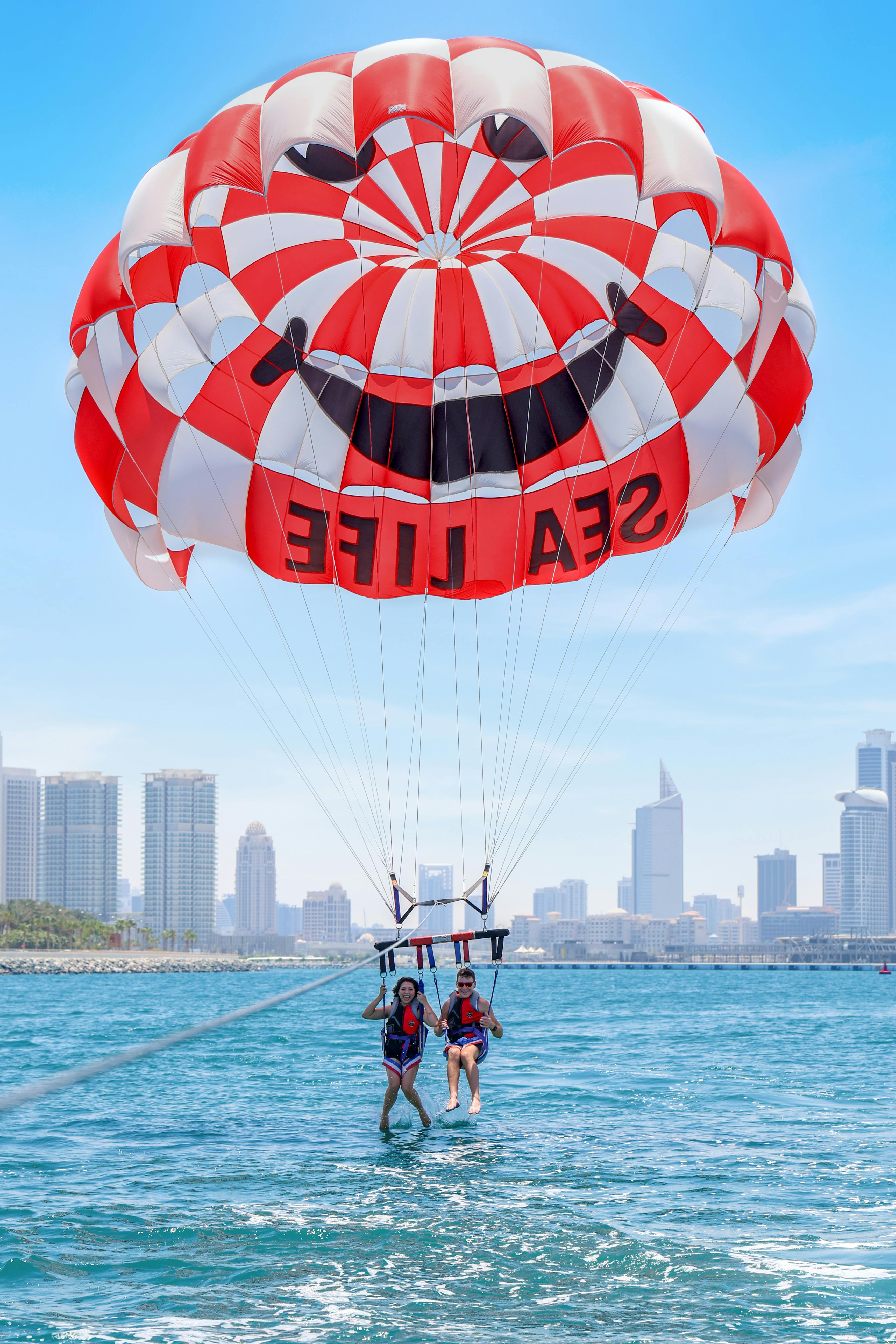 Couple on a Parachute · Free Stock Photo