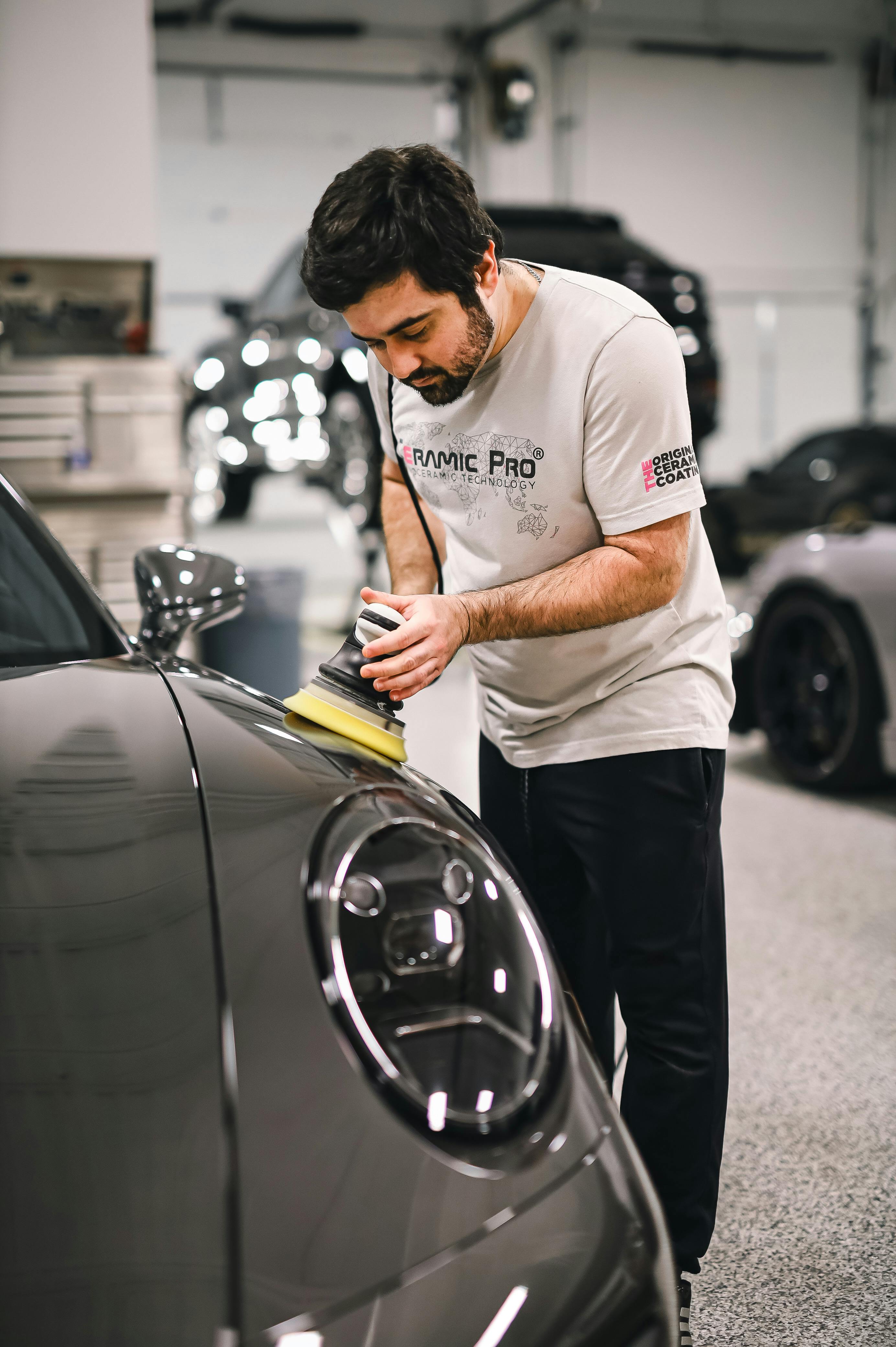 Man Cleaning Sports Car · Free Stock Photo