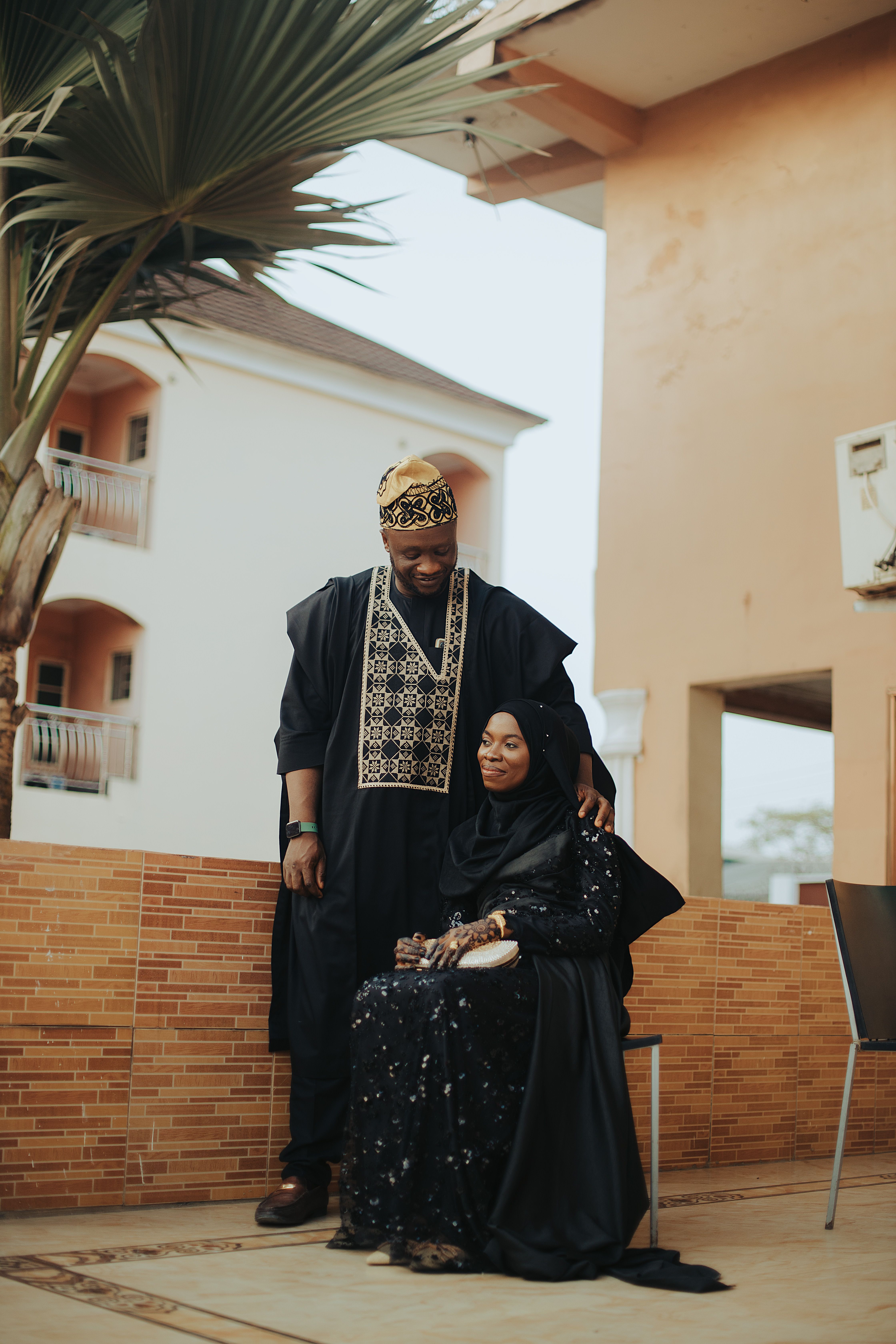 Bride and Groom Wearing Traditional Clothing Posing on a Terrace · Free ...