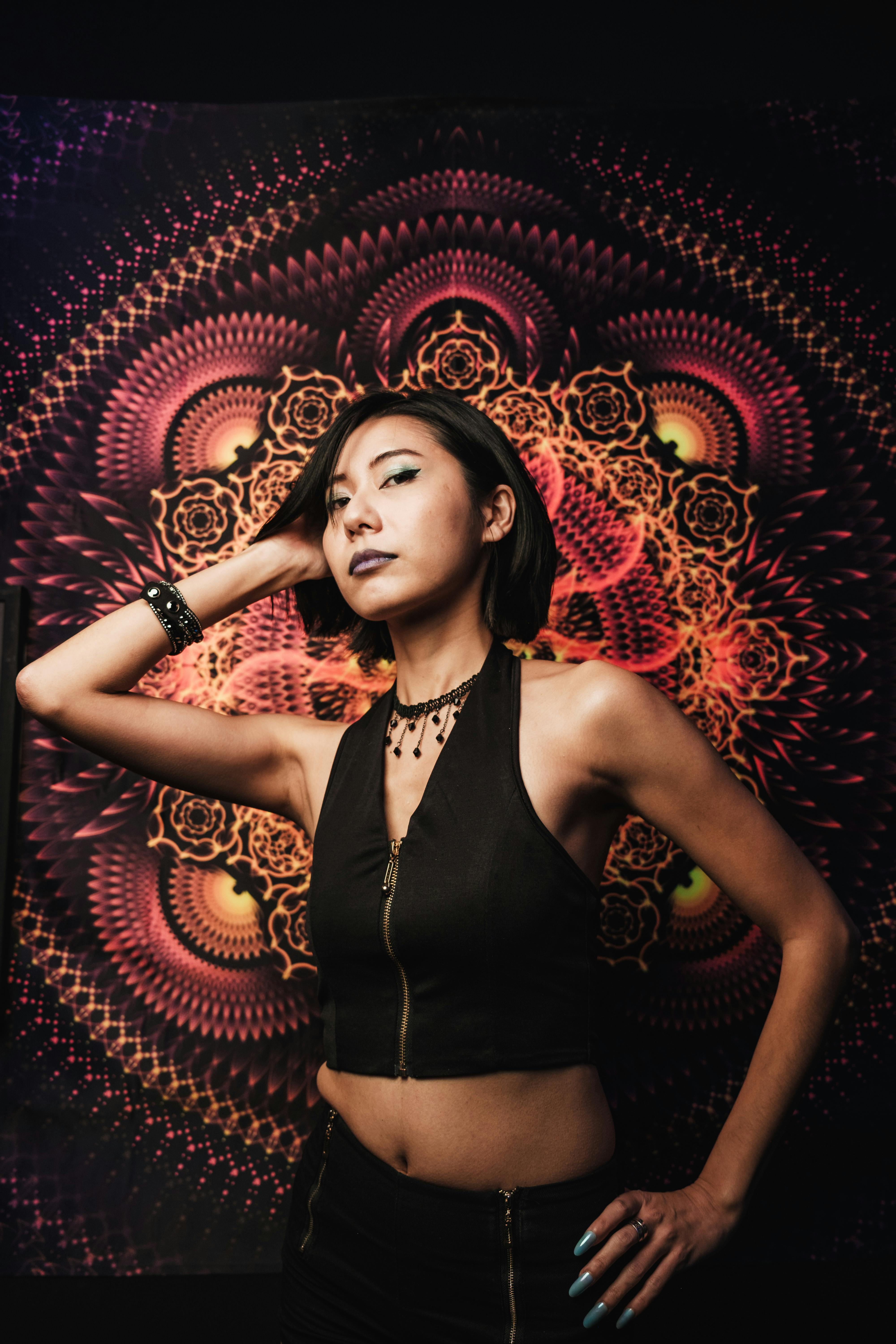 Portrait of Model in Dress Against Black Backdrop · Free Stock Photo