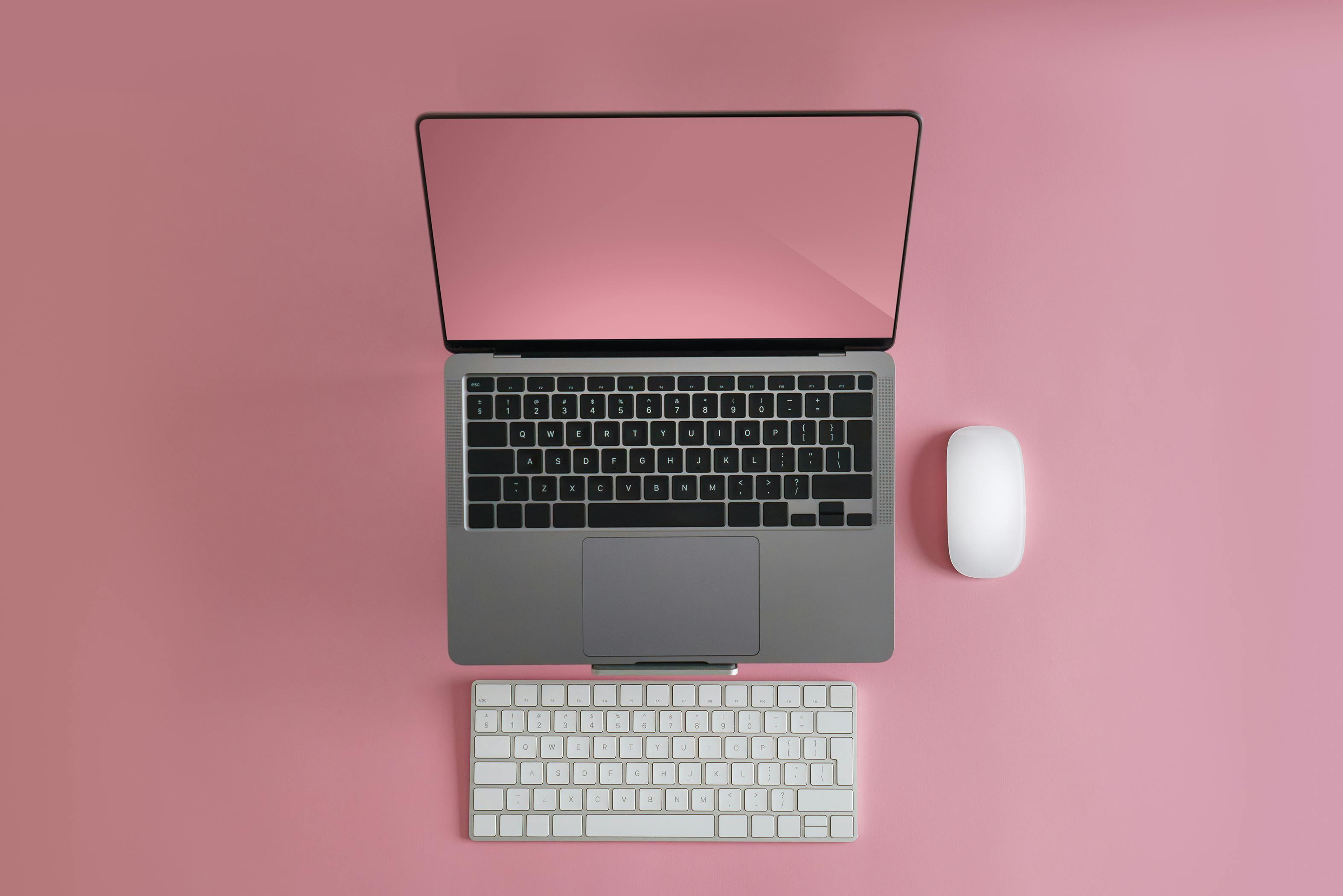 Peach screen. Laptop. · Free Stock Photo