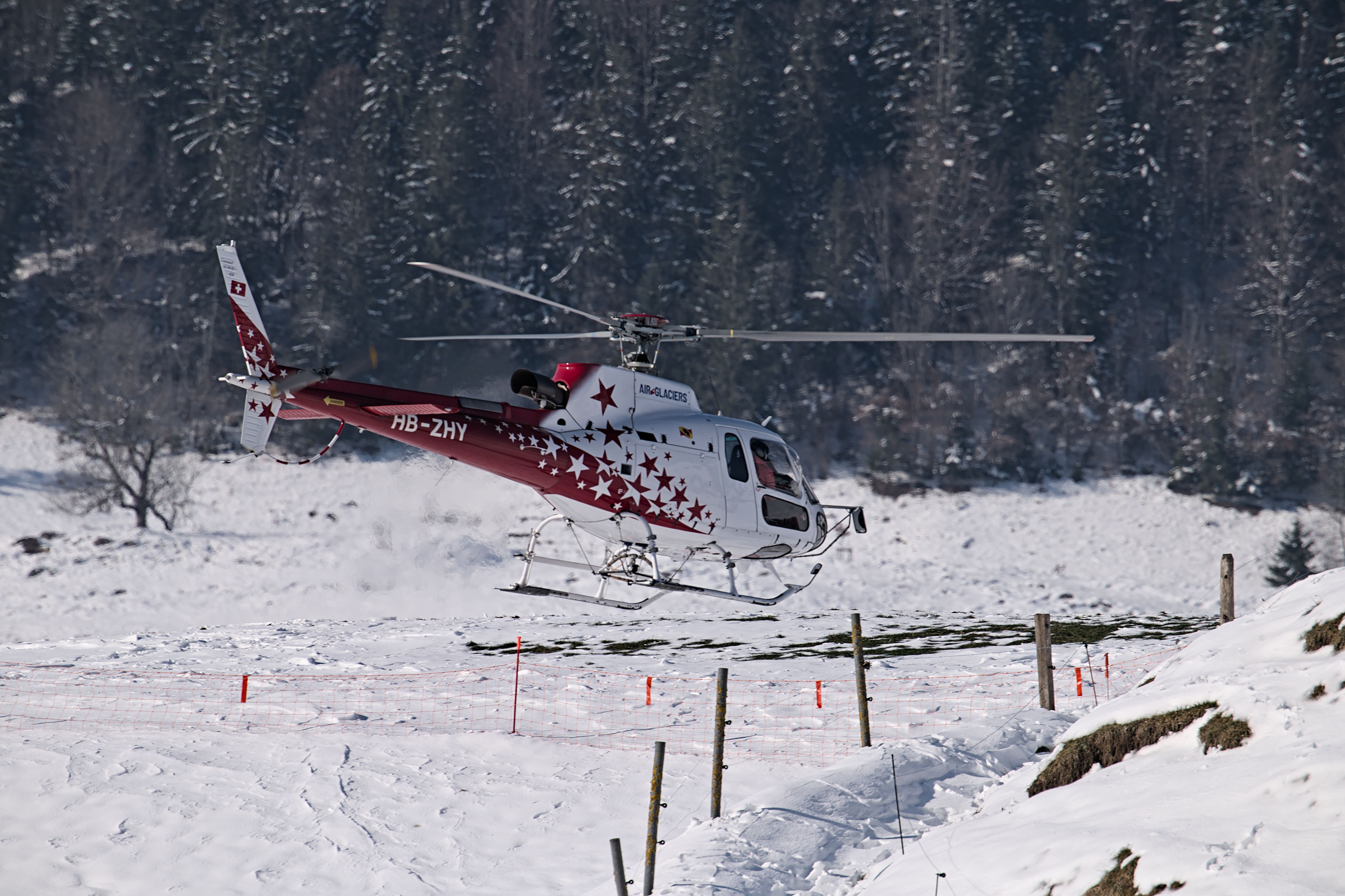 Helicopter Flying over Snow in Switzerland · Free Stock Photo