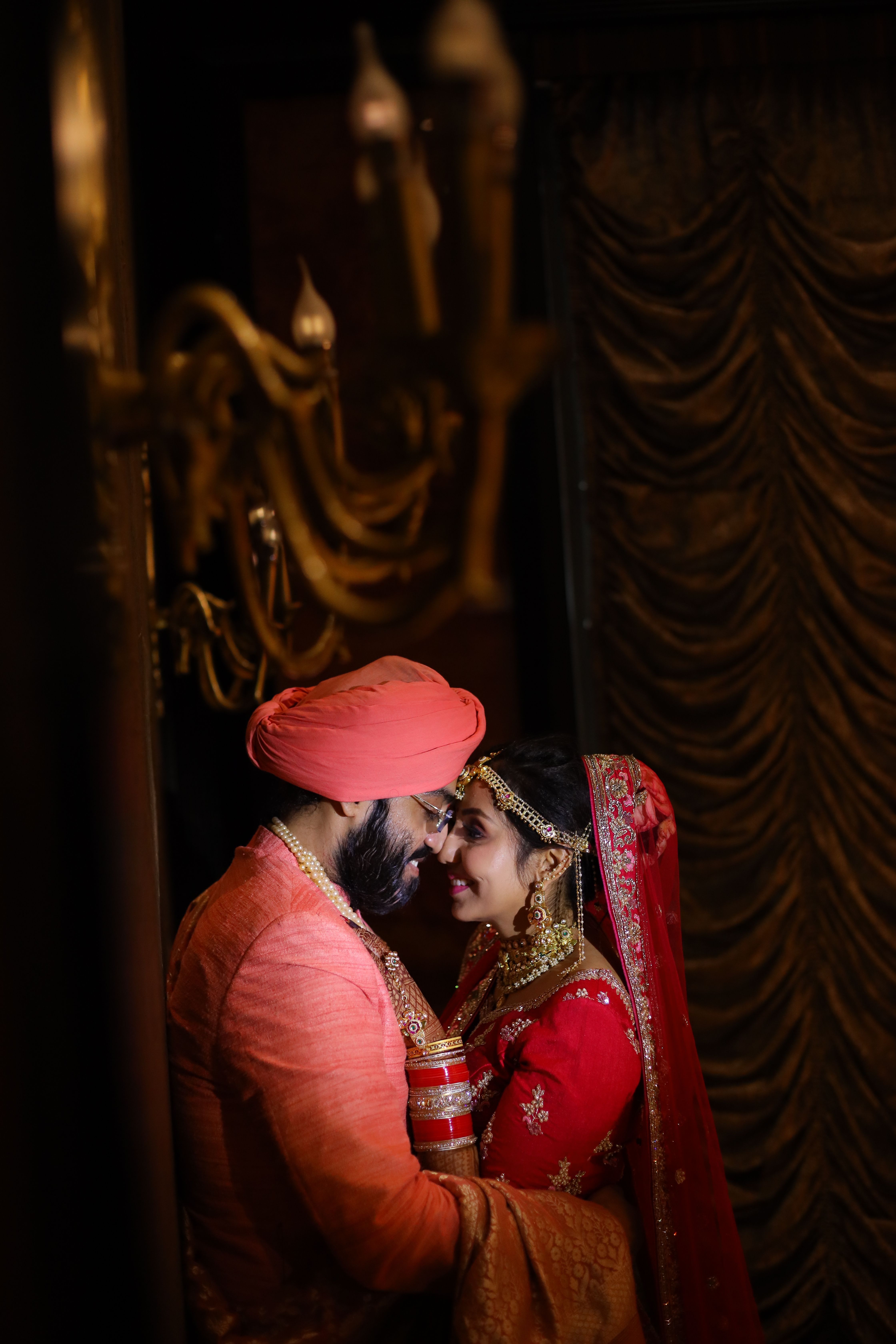 Bride and Groom in Traditional Clothing Embracing and Smiling · Free ...