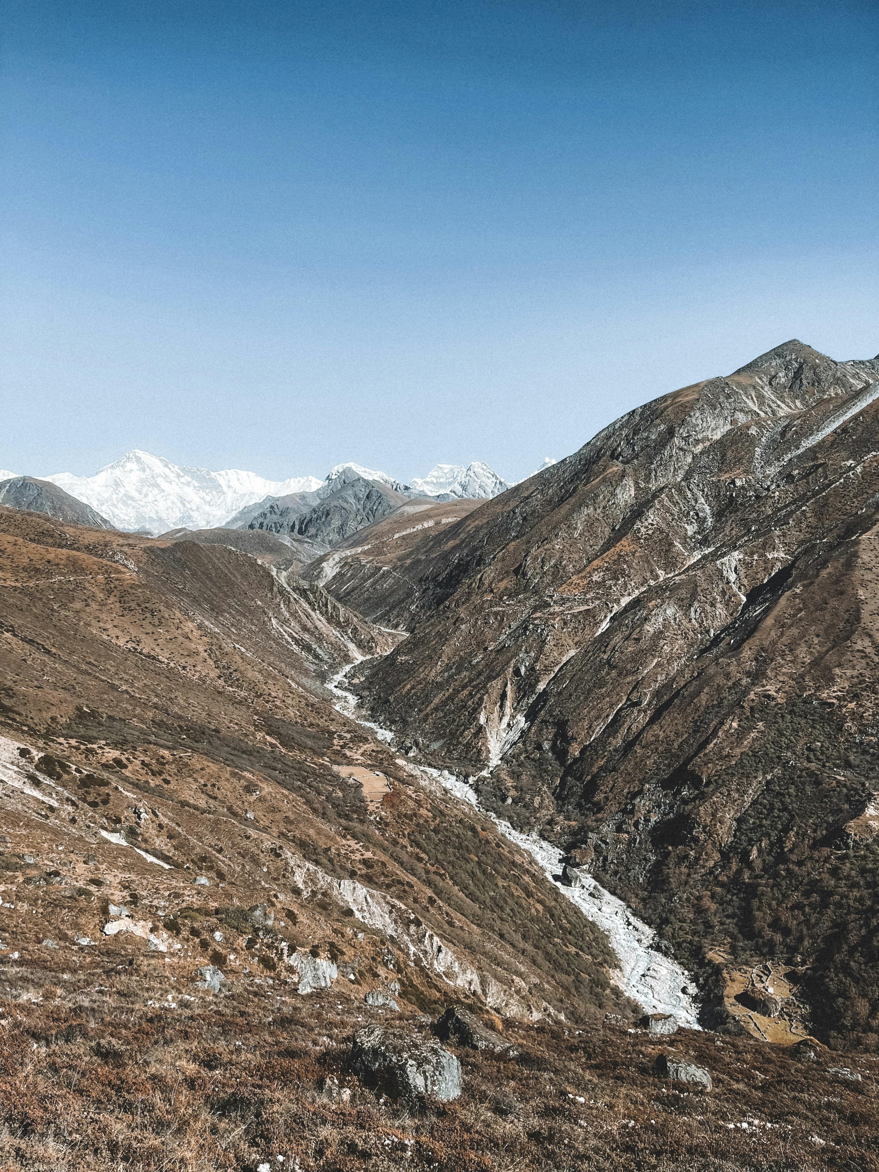 Sunlit Valley and Hills · Free Stock Photo