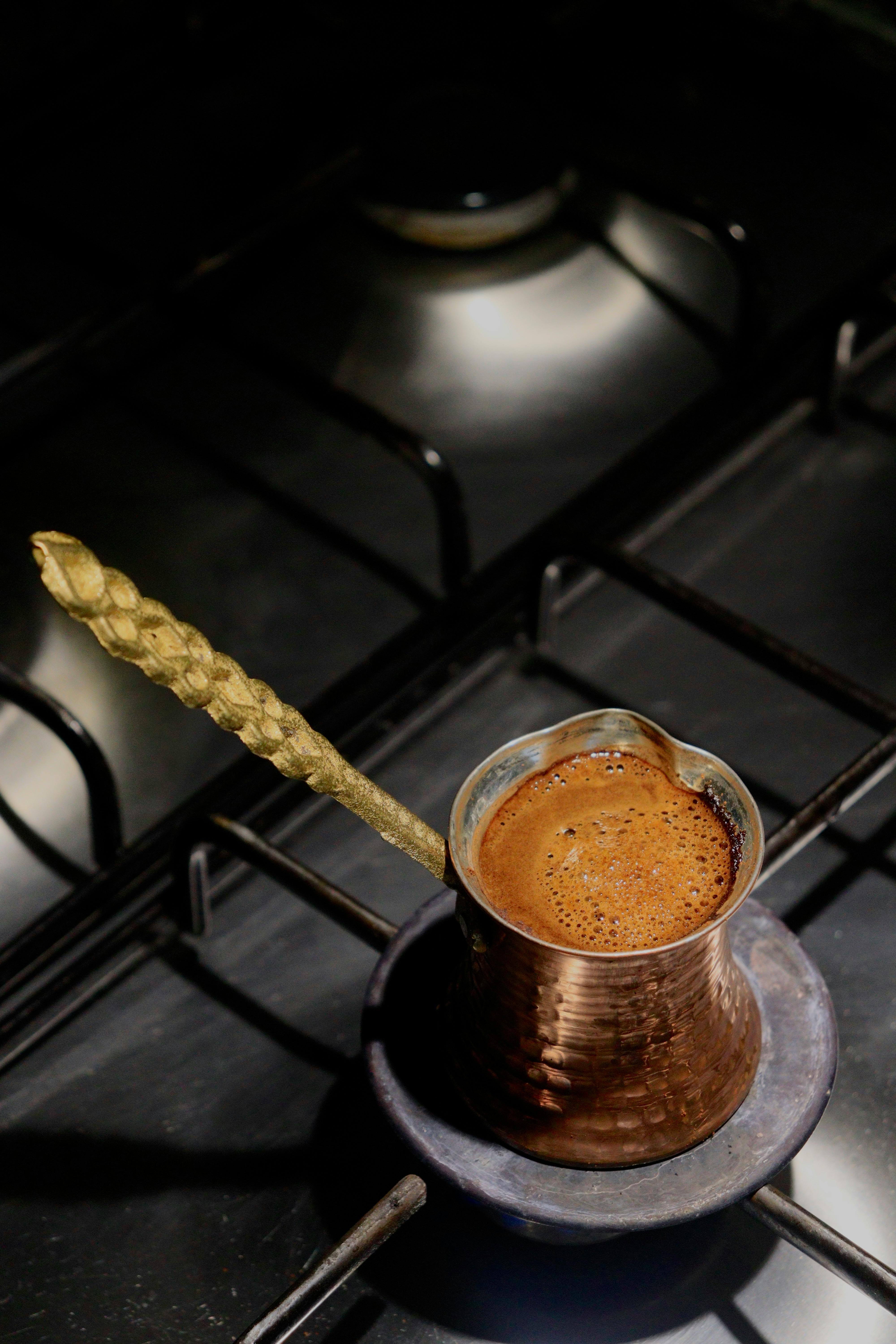 Brewing Coffee in Long Handled Pot · Free Stock Photo