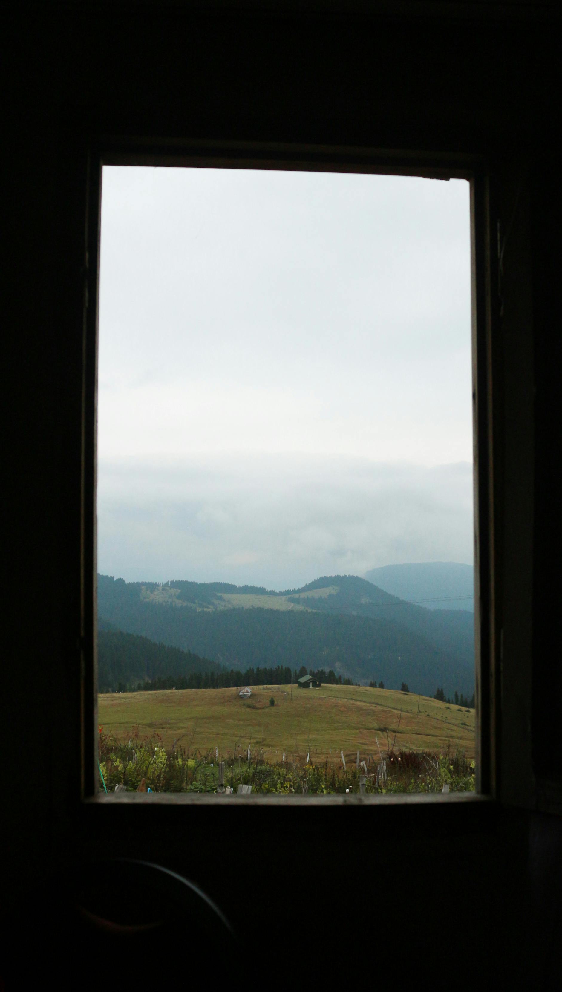 View of Mountain Valley From a Window · Free Stock Photo