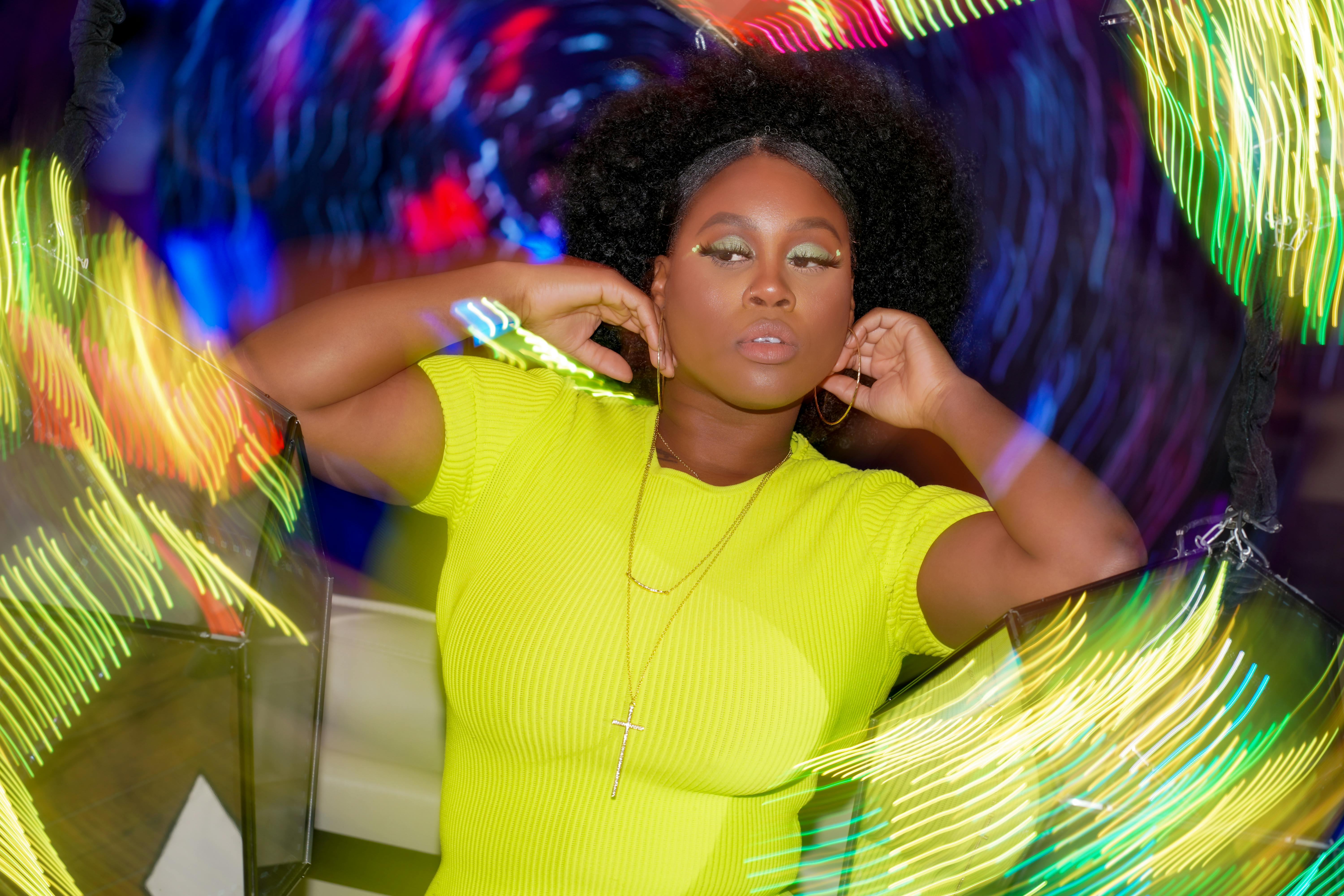 Lights around Woman in Yellow Clothes · Free Stock Photo