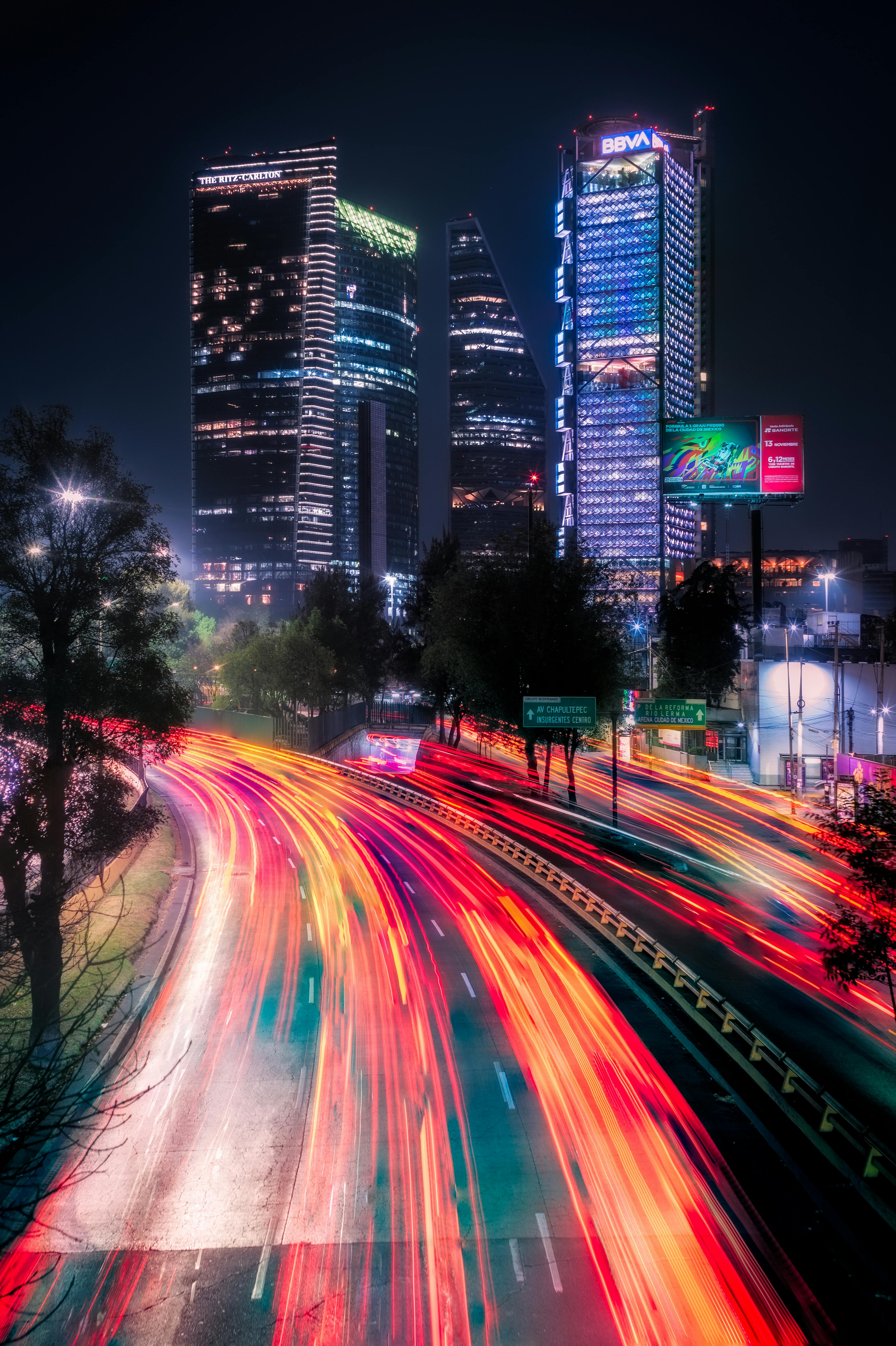 Red Light over Street in City with Skyscrapers behind at Night · Free ...