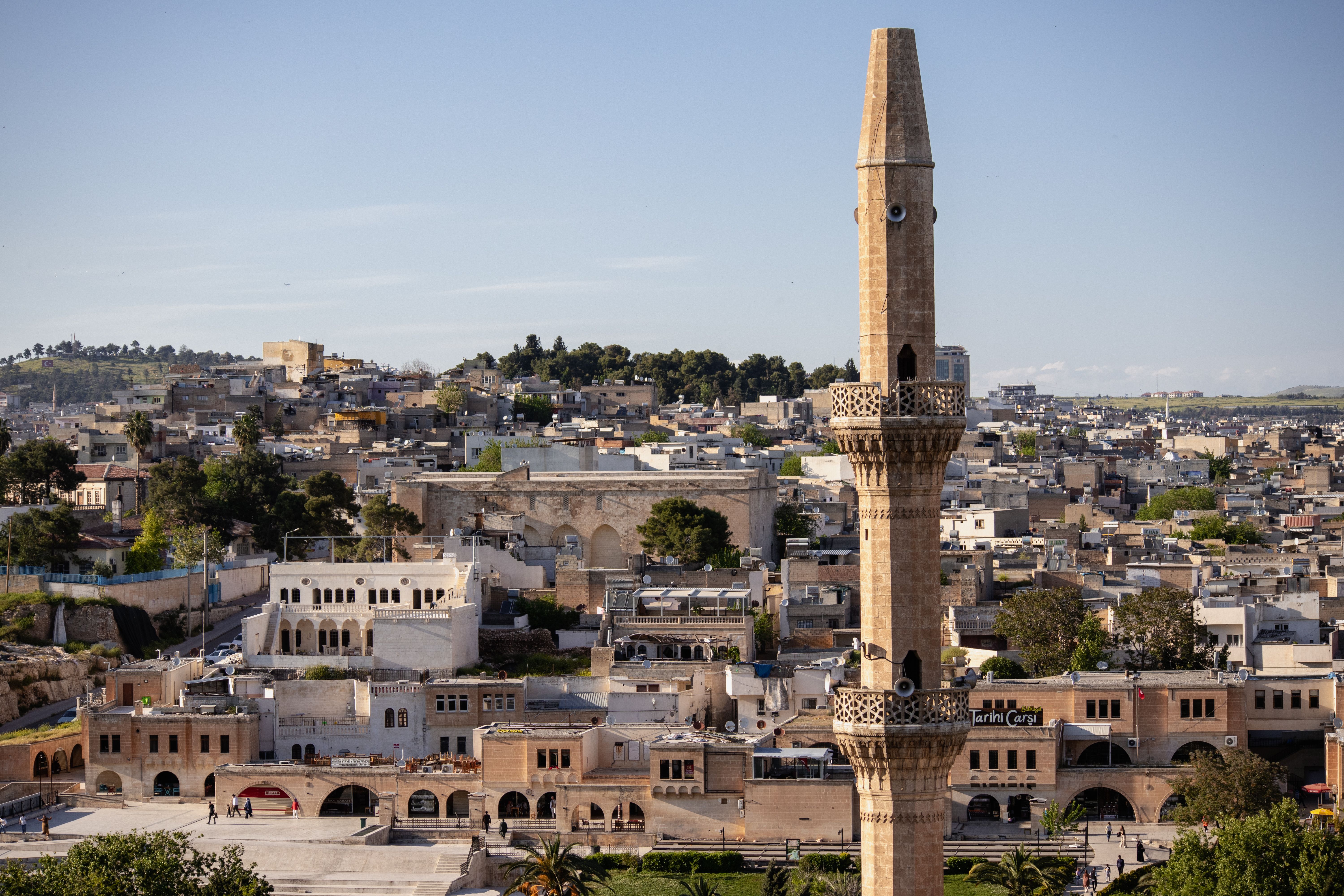 View of a Minaret and Panoramic View of a City · Free Stock Photo