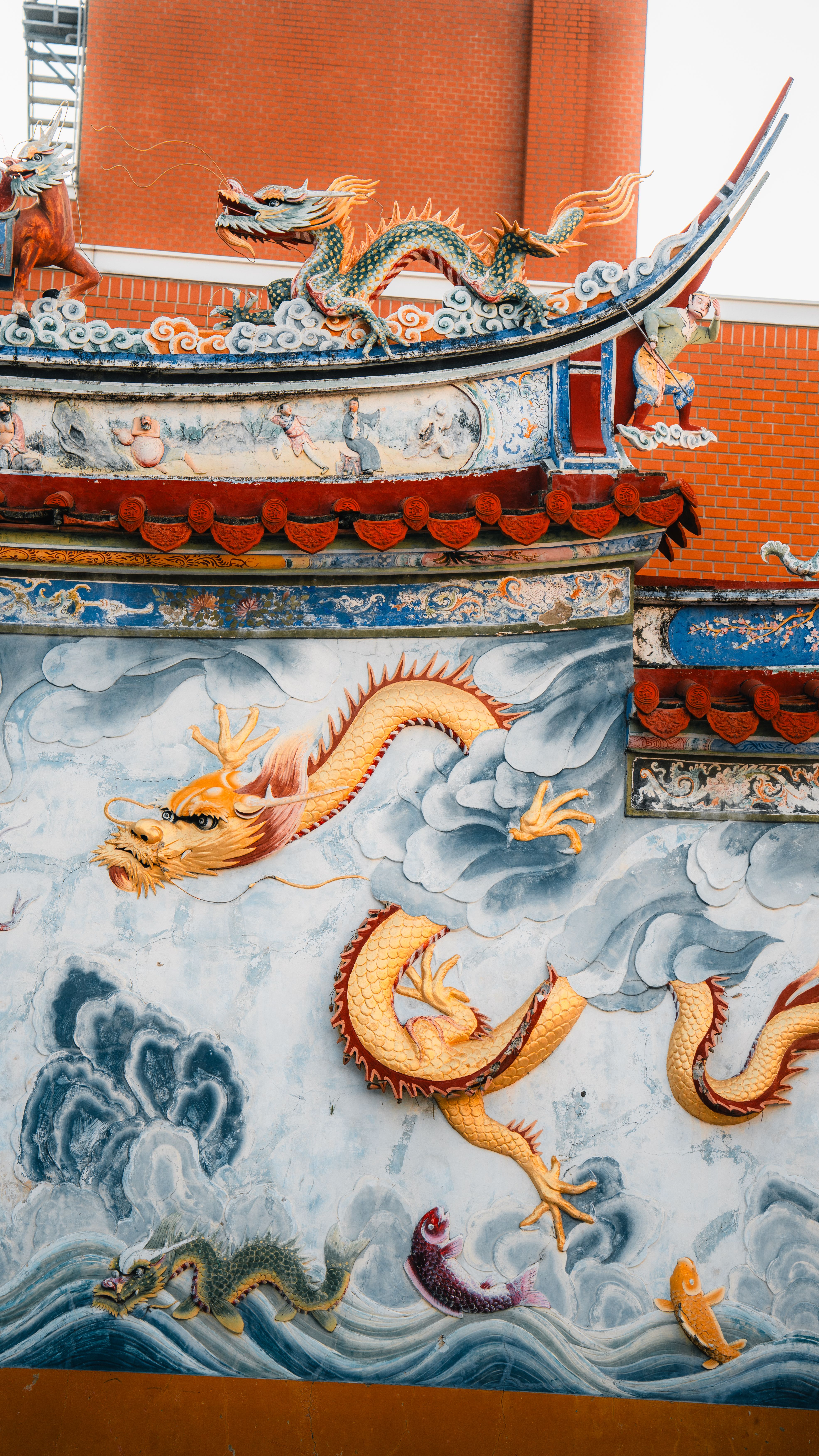 Close-up of the Facade of a Building with a Painting of a Snake and ...