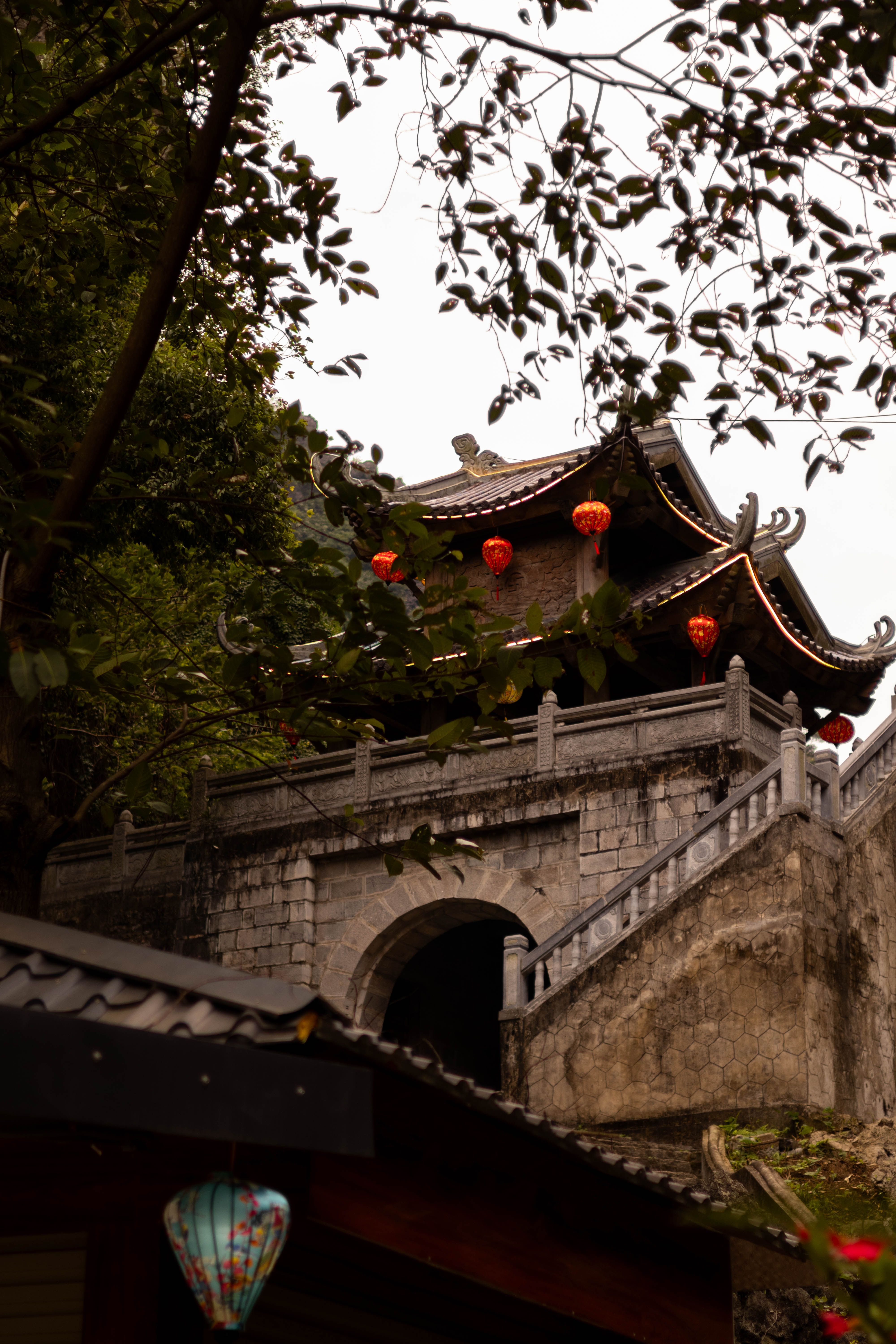 Exterior of an Old Shrine with Lanterns · Free Stock Photo