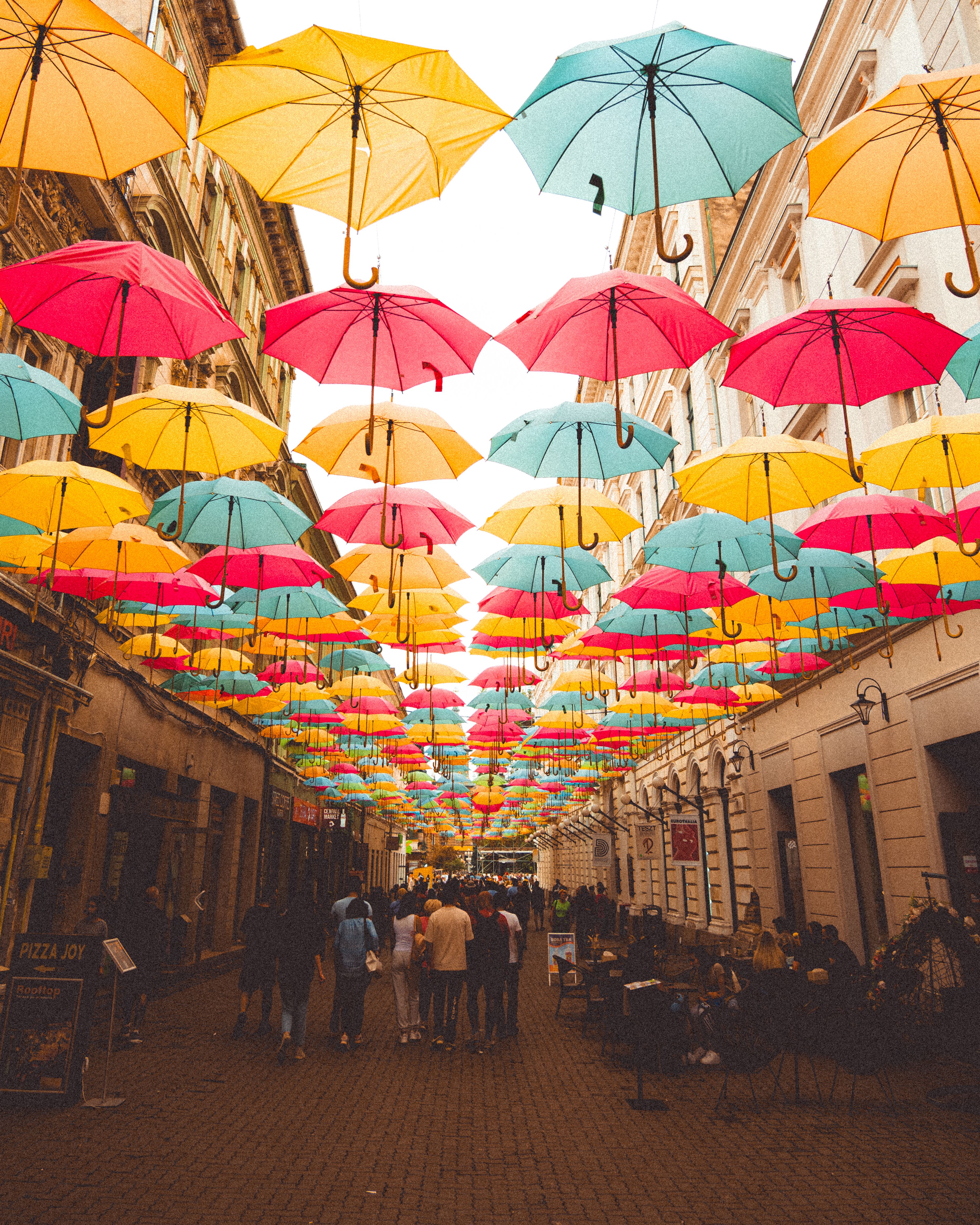 Colorful Umbrellas over Alley in Town · Free Stock Photo